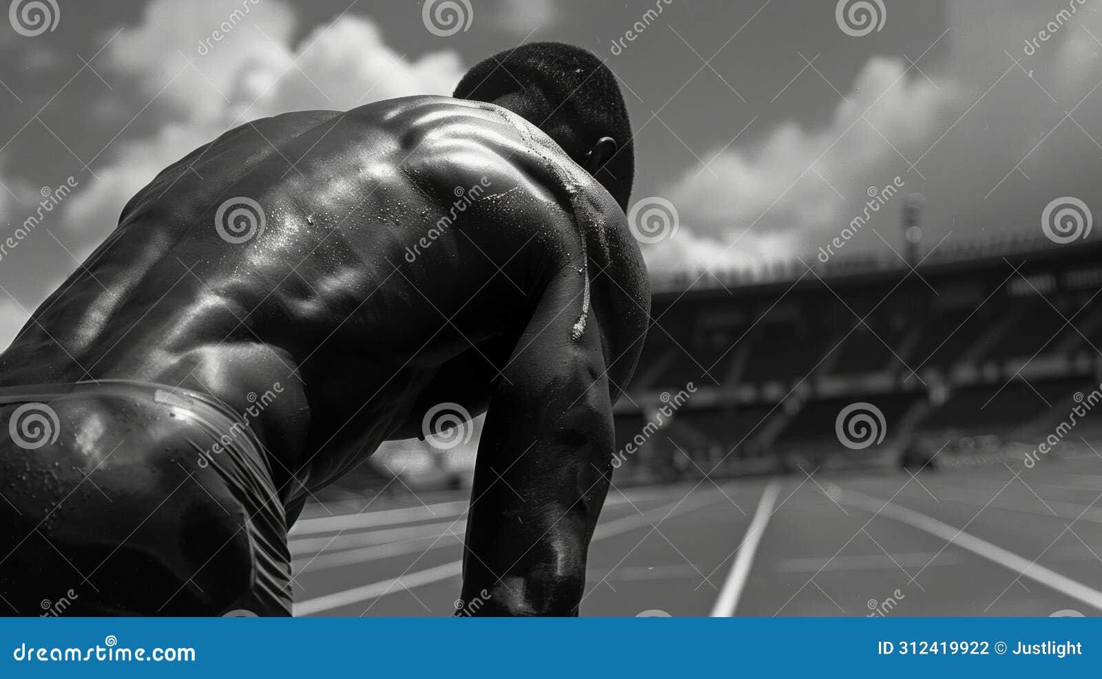 The Muscles in a Sprinters Back Tensed and Ready for the Explosive ...