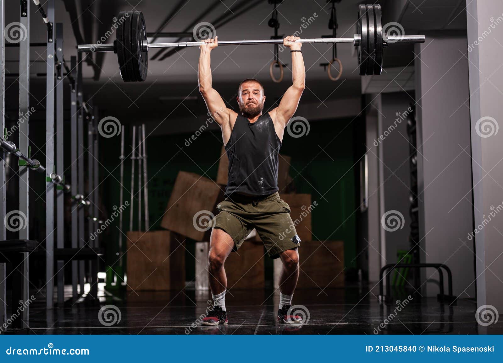 Muscular Athlete Lifting Very Heavy Barbell Stock Photo - Image of ...