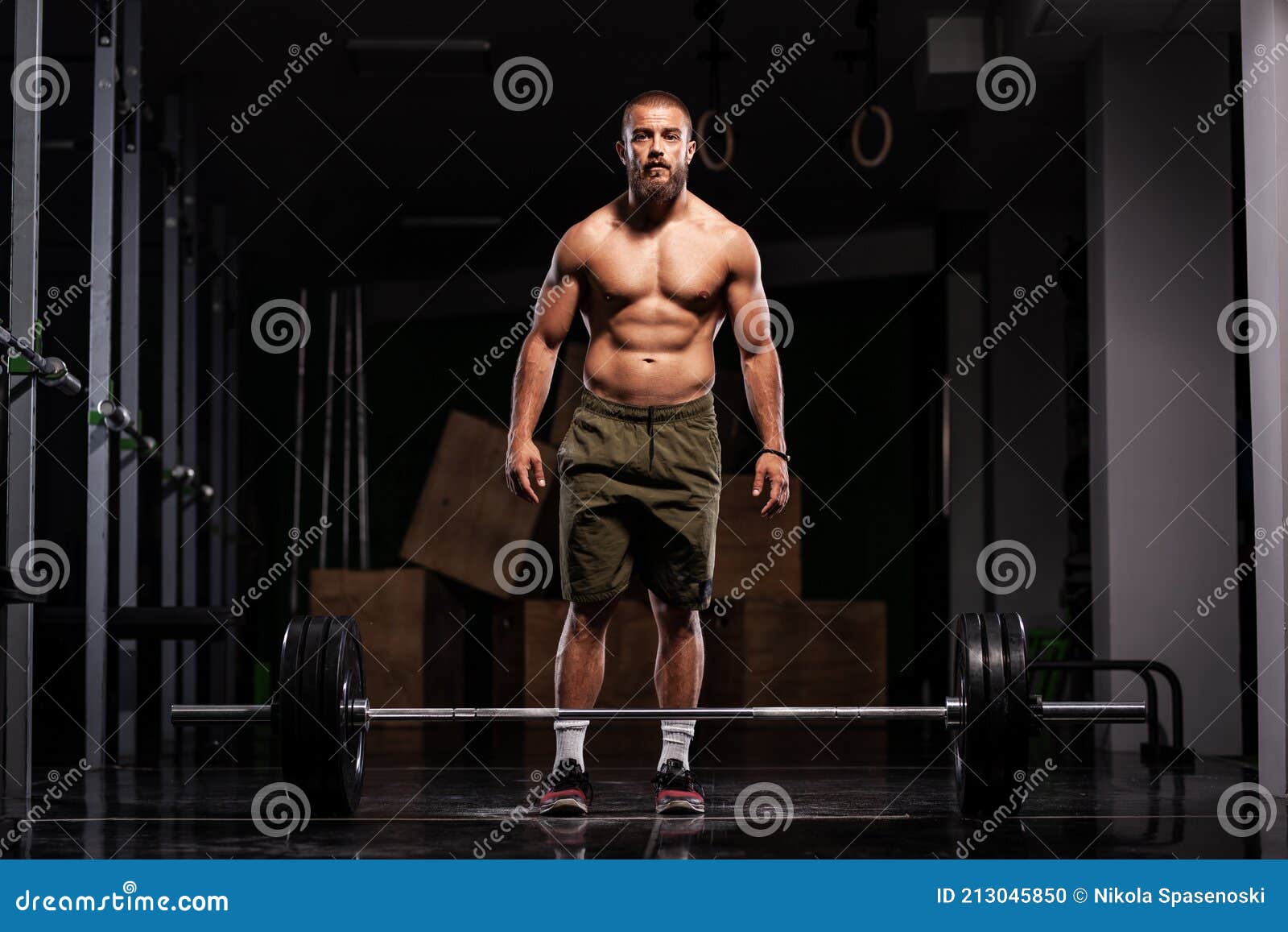 Muscular Athlete Lifting Very Heavy Barbell Stock Photo - Image of body ...