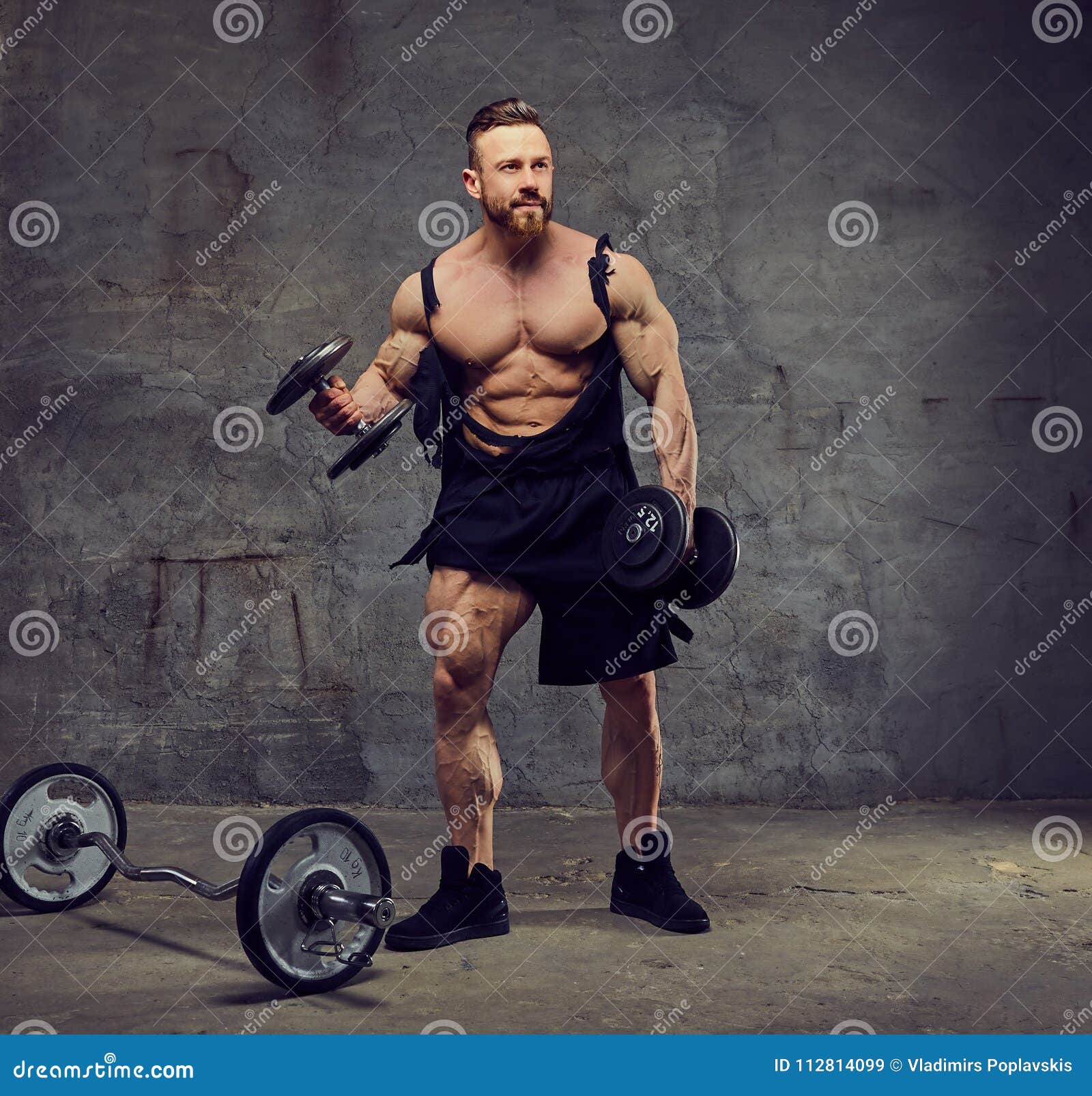Muscular, Bearded Male Doing Biceps Workouts with Dumbbells. Stock ...