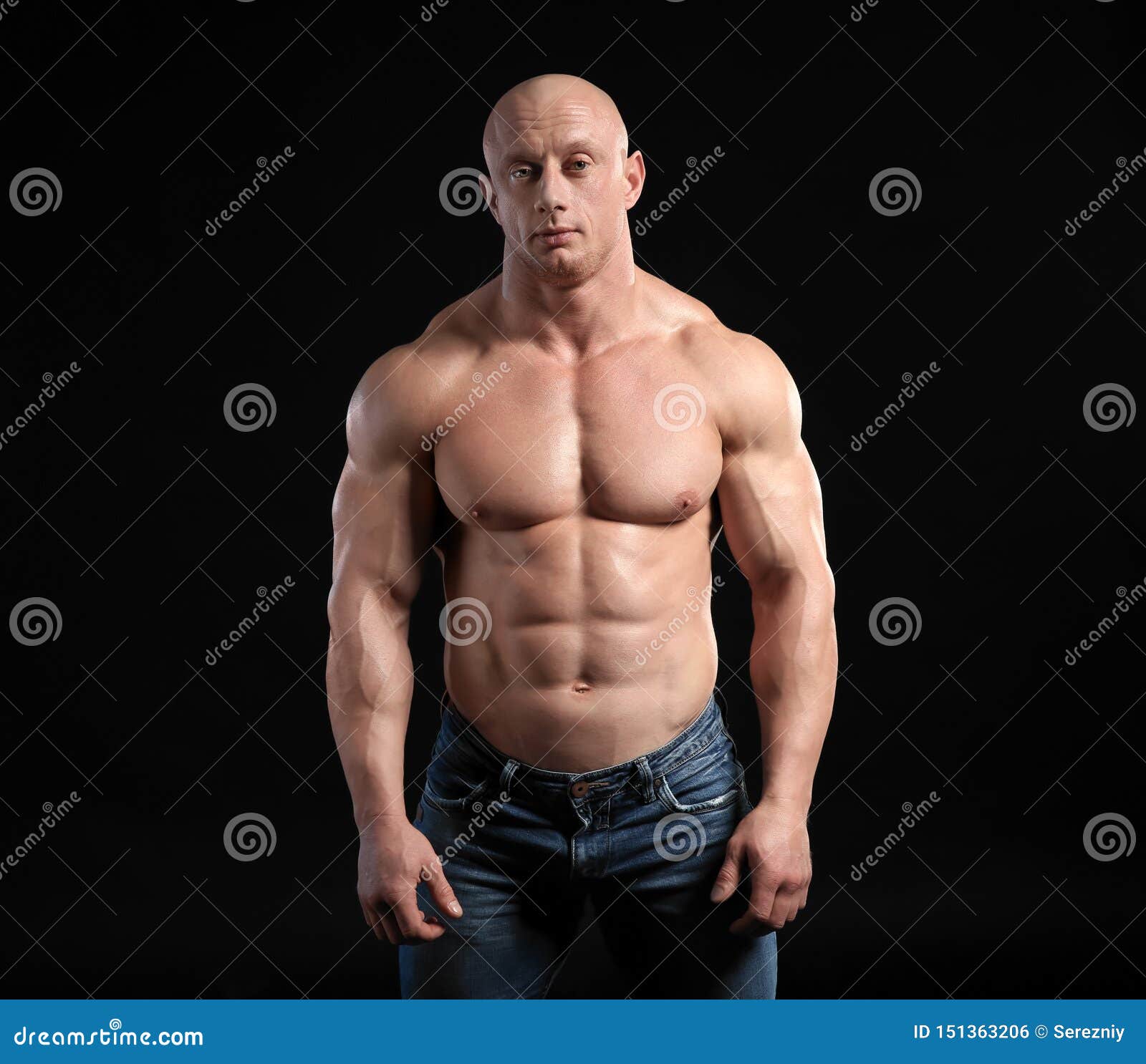 Muscular Bodybuilder on Dark Background Stock Photo - Image of posing ...