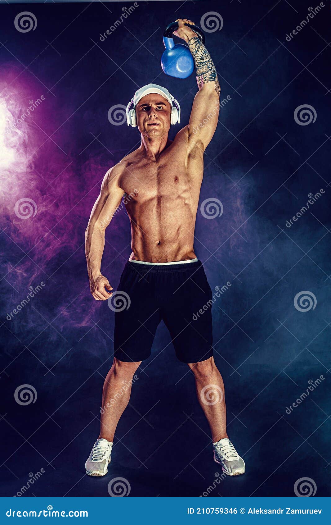 Muscular Bodybuilder Doing Exercise with Kettlebell. Studio Shot Stock ...