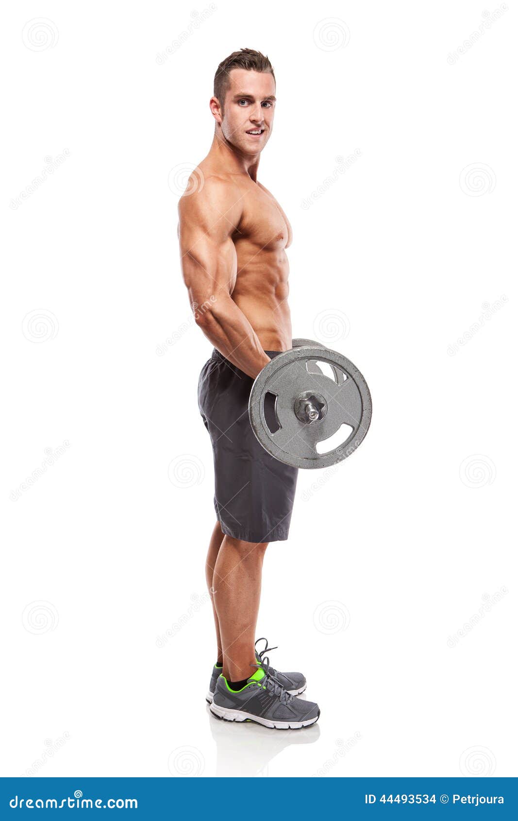 Muscular Bodybuilder Guy Doing Exercises with Big Dumbbell Over Stock ...