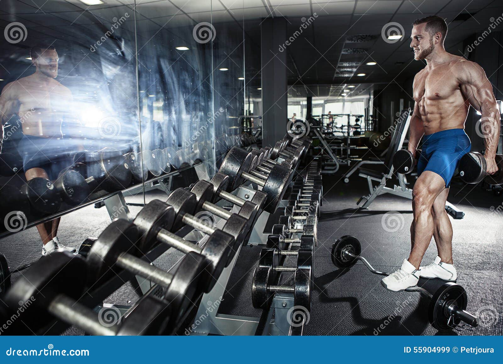 Muscular Bodybuilder Guy Doing Exercises with Dumbbell Stock Image ...