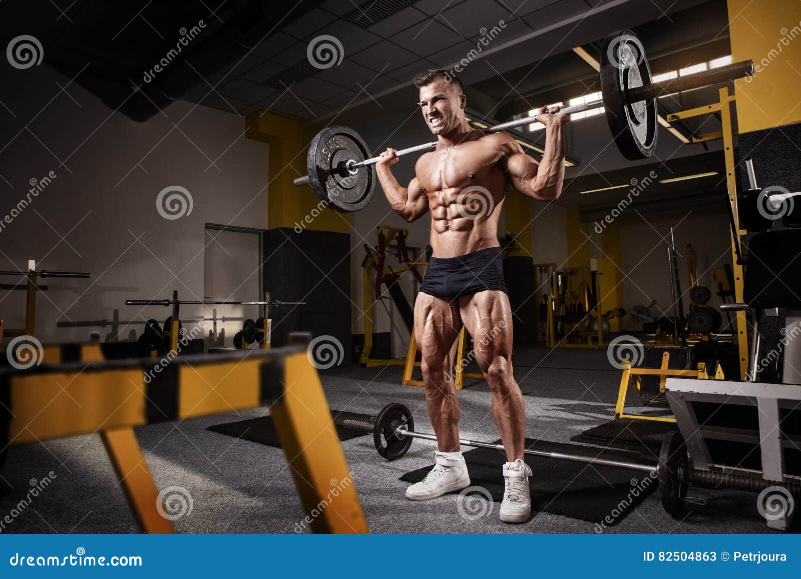 Muscular Bodybuilder Guy Doing Exercises with Dumbbell Stock Image ...