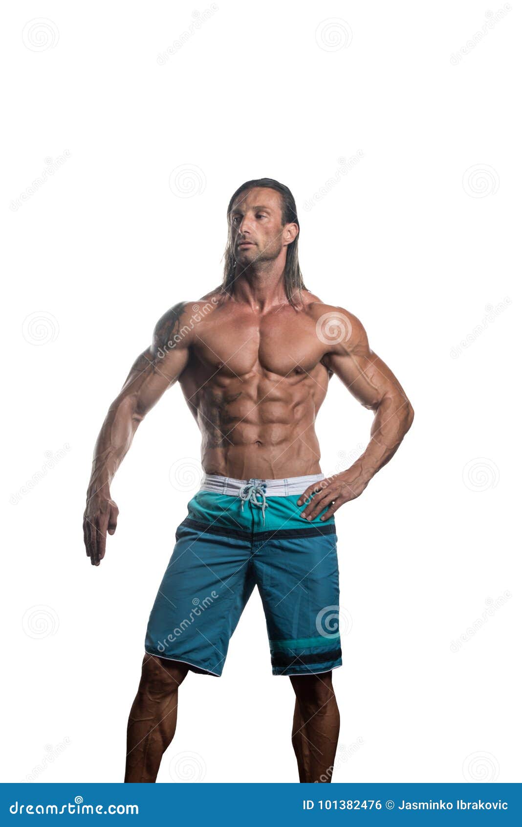 Muscular Bodybuilder Man Posing Over White Background Stock Photo ...
