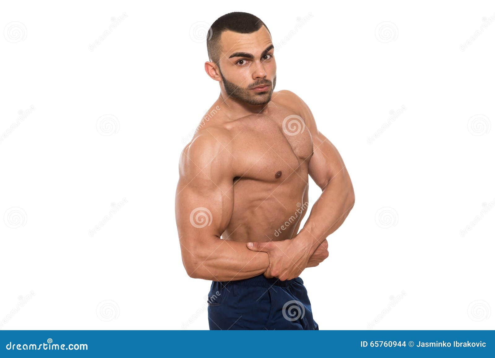 Muscular Bodybuilder Man Posing Over White Background Stock Photo ...