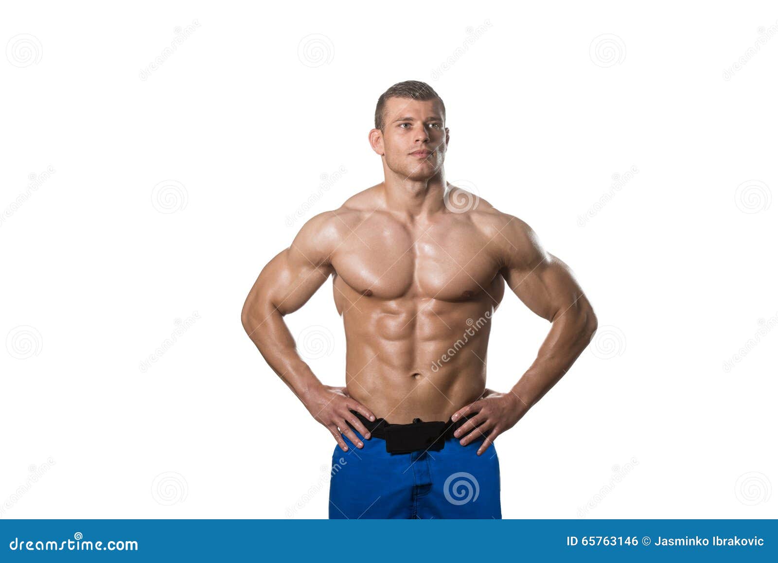 Muscular Bodybuilder Man Posing Over White Background Stock Photo ...