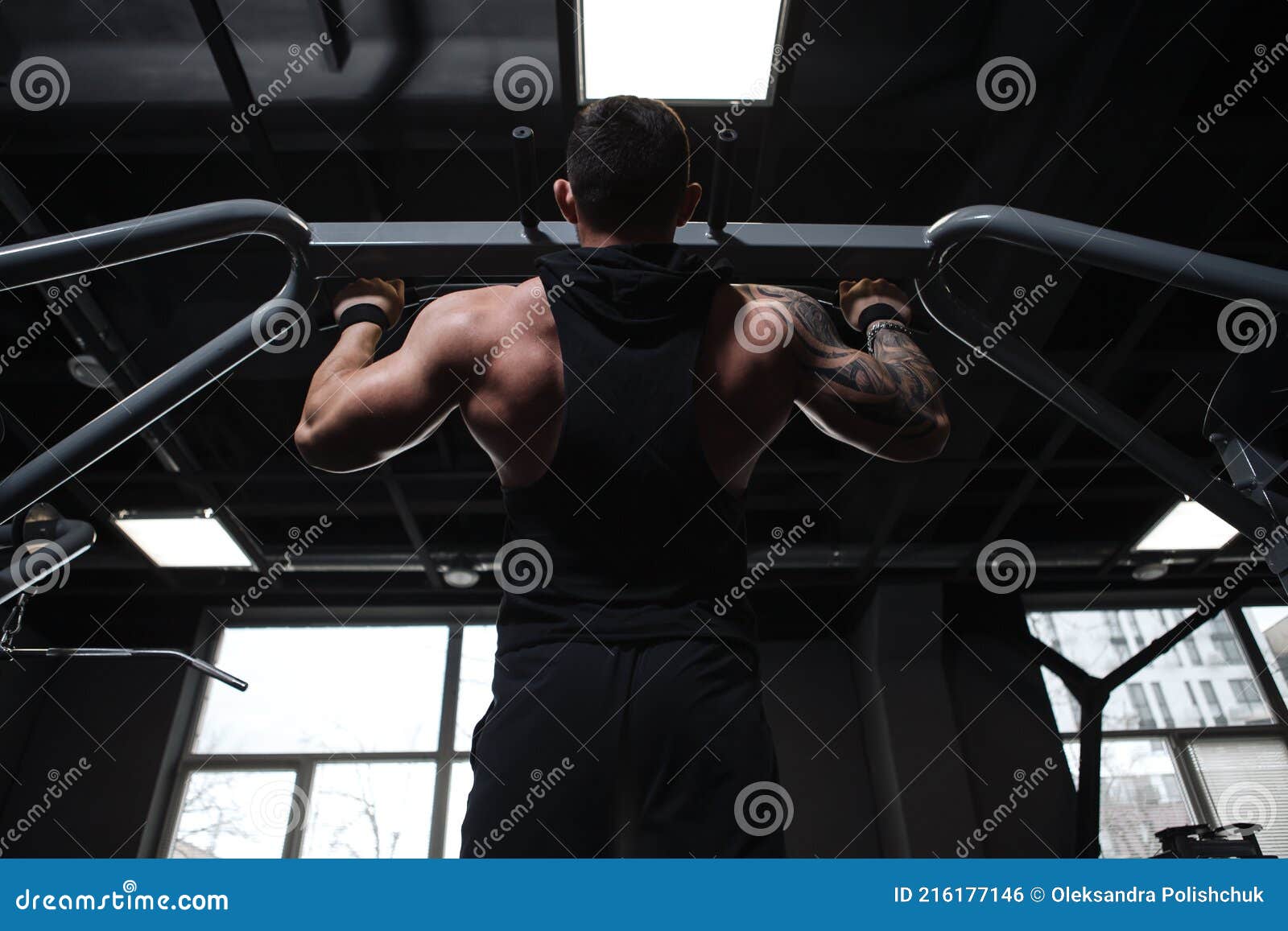 Muscular Bodybuilder Working Out at Gym Stock Photo - Image of pull ...