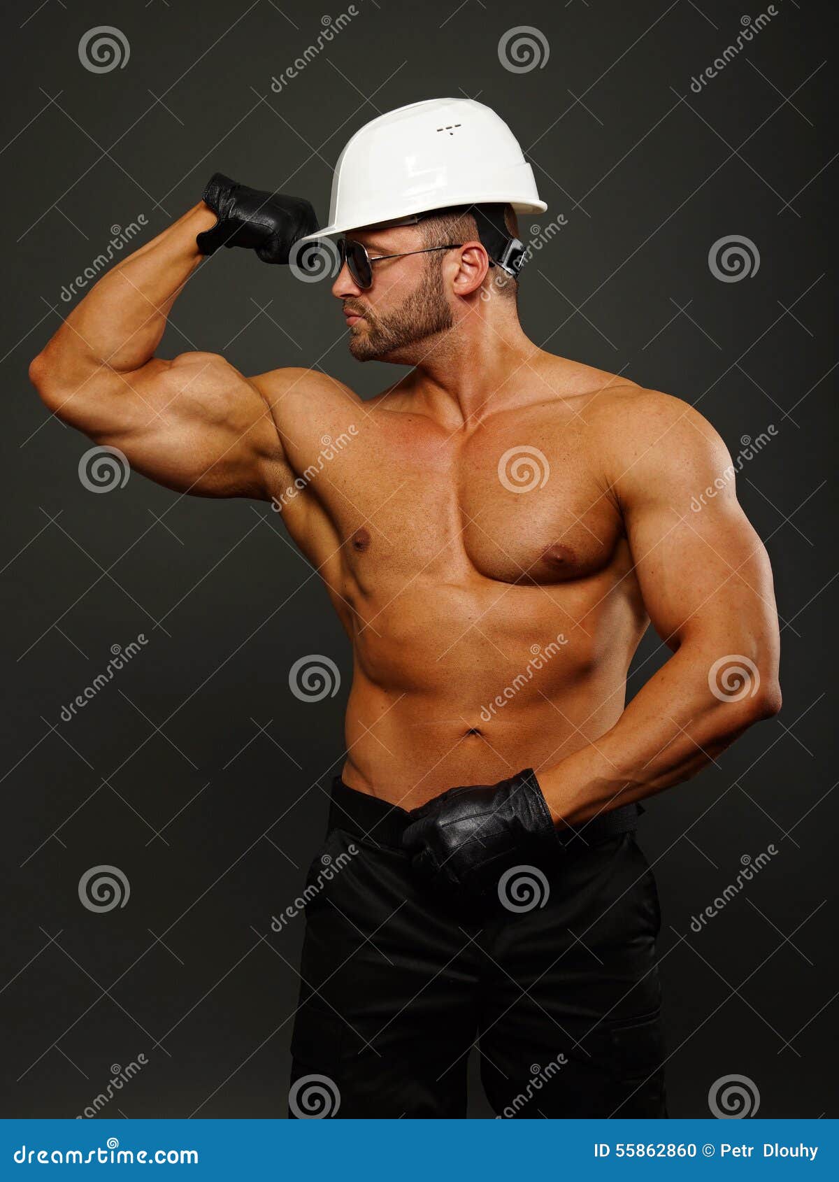 Muscular Builder in a Helmet Stock Photo - Image of biceps, caucasian ...