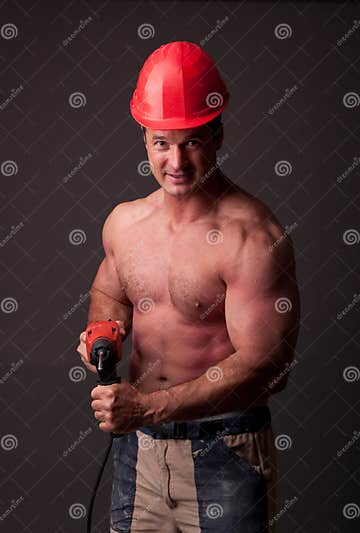 Muscular Construction Worker Stock Photo - Image of auger, handyman ...