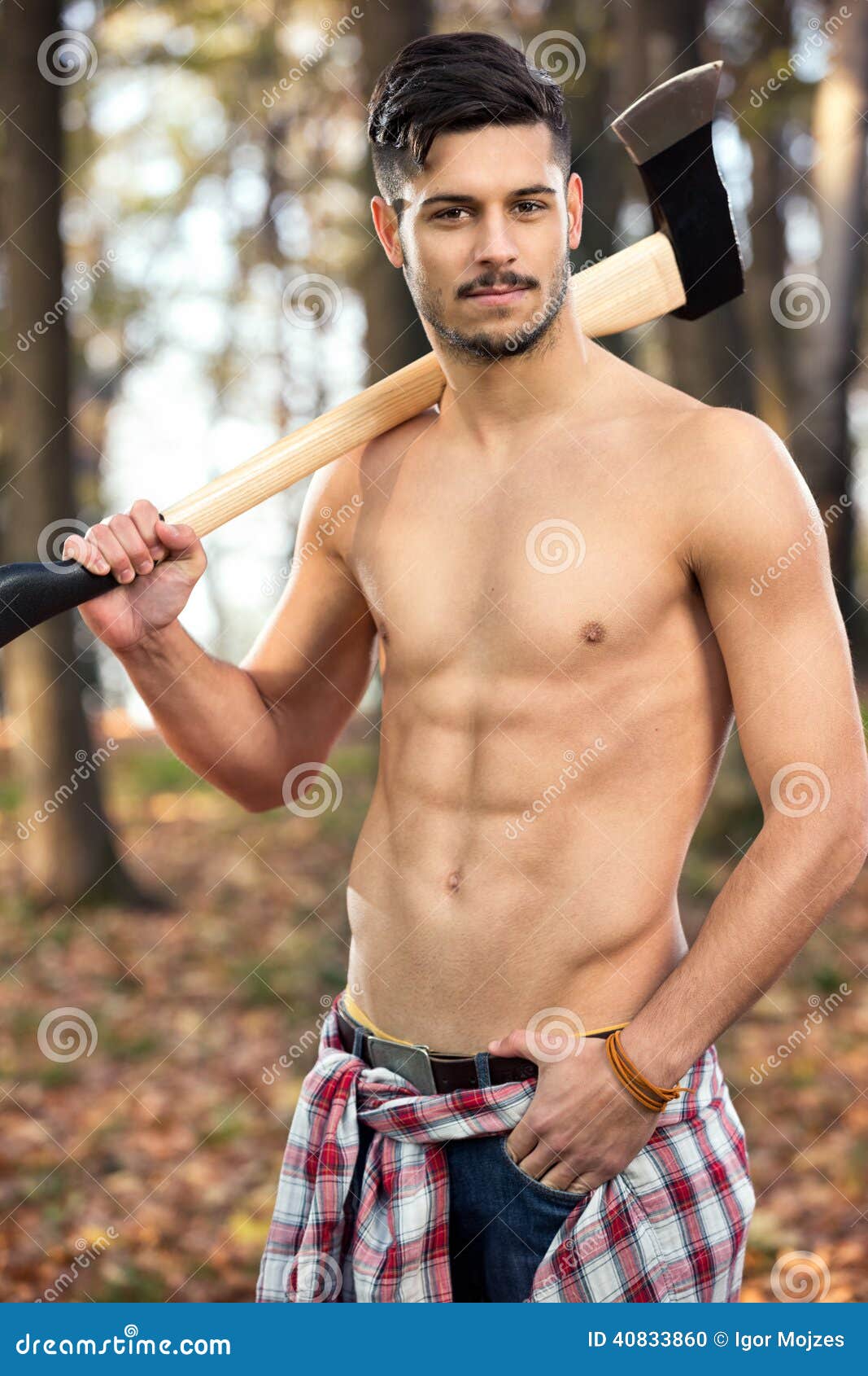 Shirtless Lumberjack With An Axe Stock Photo | CartoonDealer.com #77102106