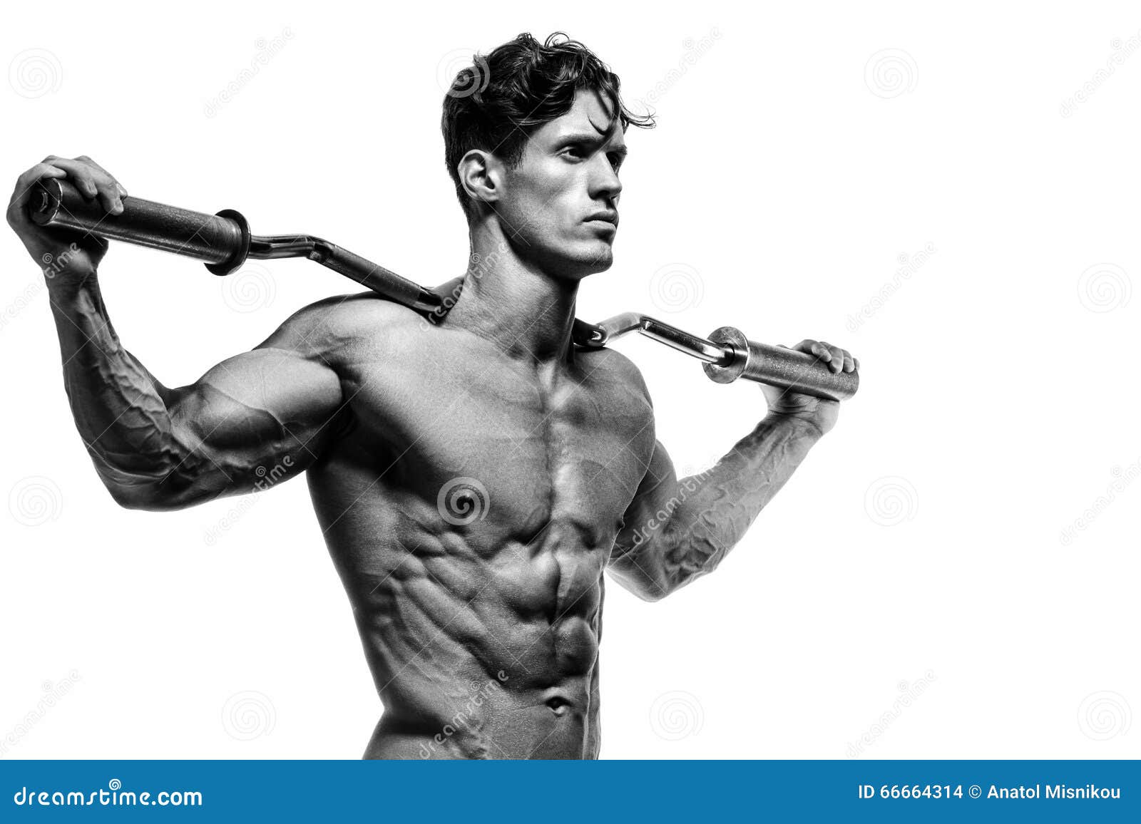 Muscular and Fit Young Bodybuilder Posing Demonstrates the Core Stock ...