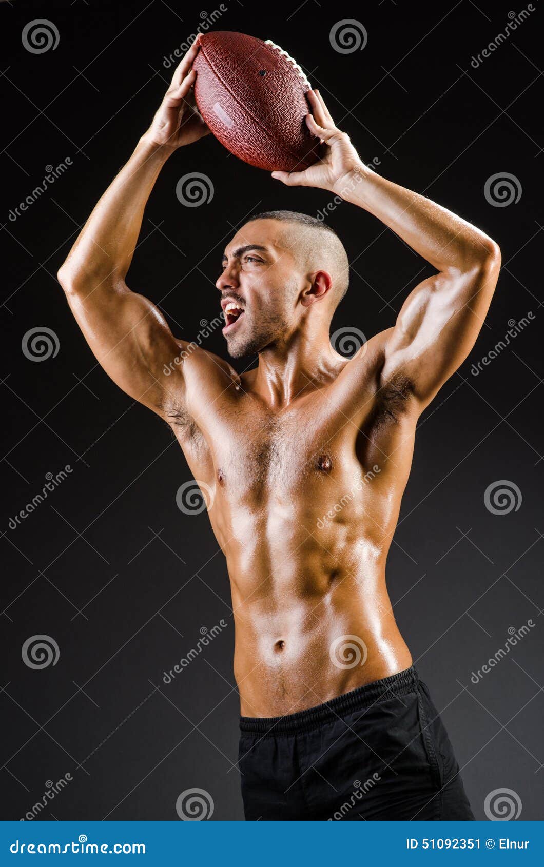 Muscular football player stock image. Image of leisure - 51092351