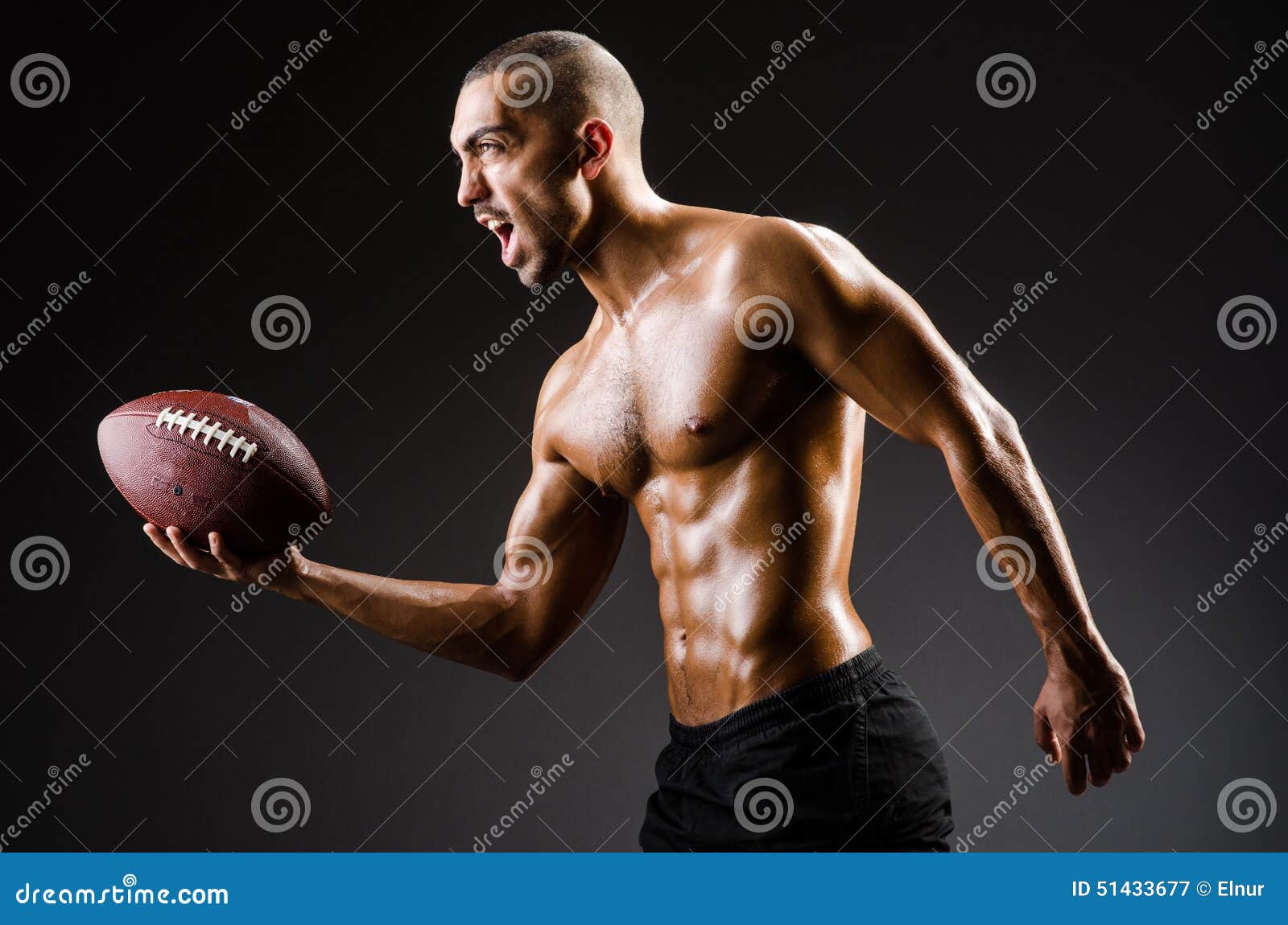 Muscular football player stock image. Image of portrait - 51433677