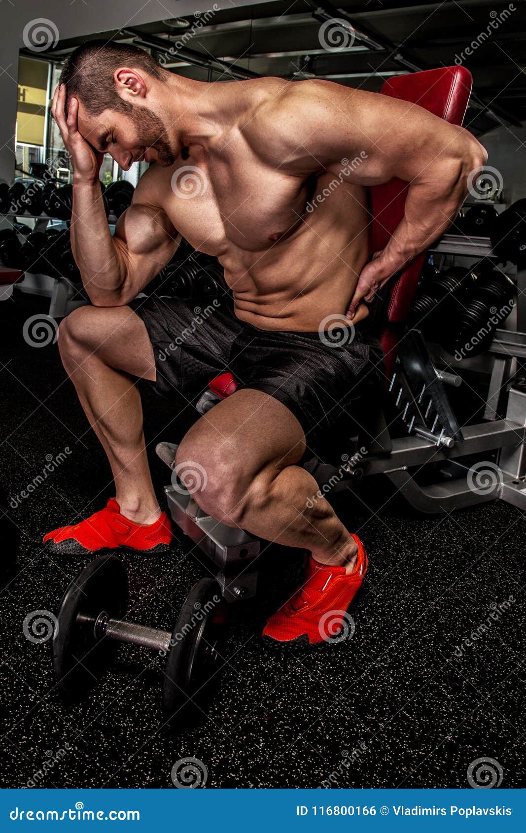 Muscular guy doing worm up stock photo. Image of active - 116800166