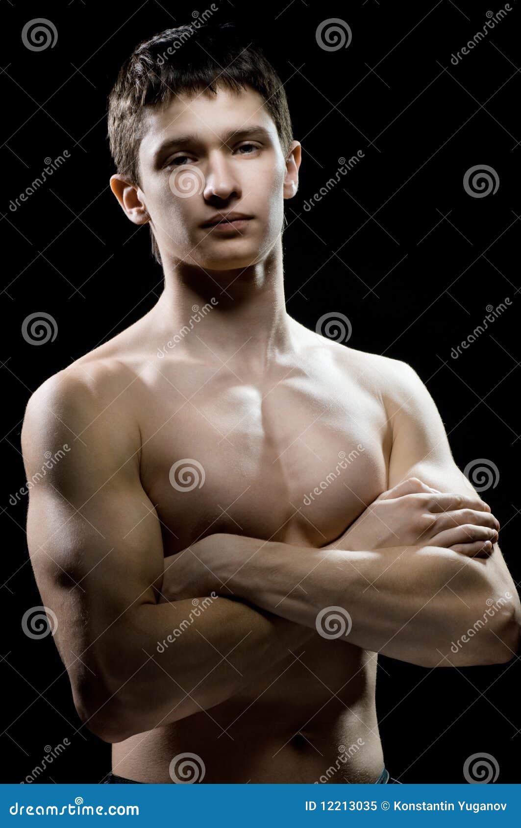 Muscular Male Bodybuilder Demostrates His Strong Body, Lifts Dumbbell ...