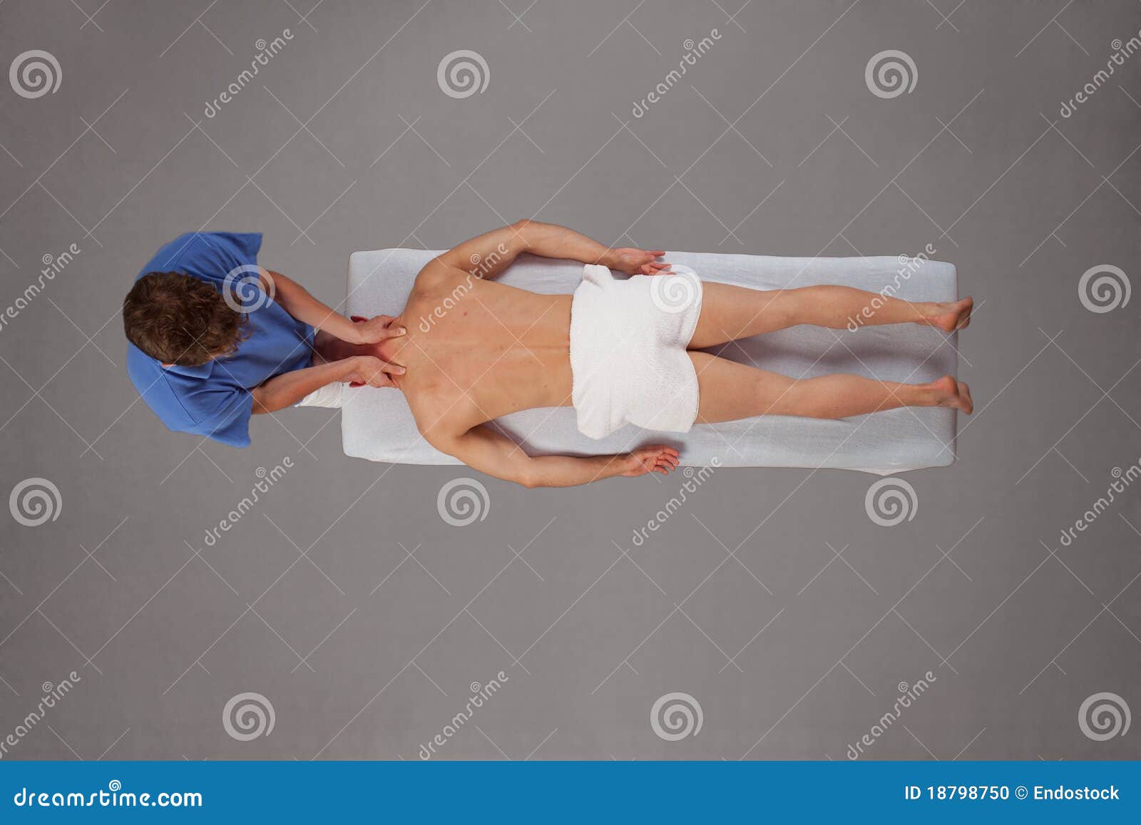 Muscular Man Being Massaged by Therapist Stock Photo - Image of aerial ...