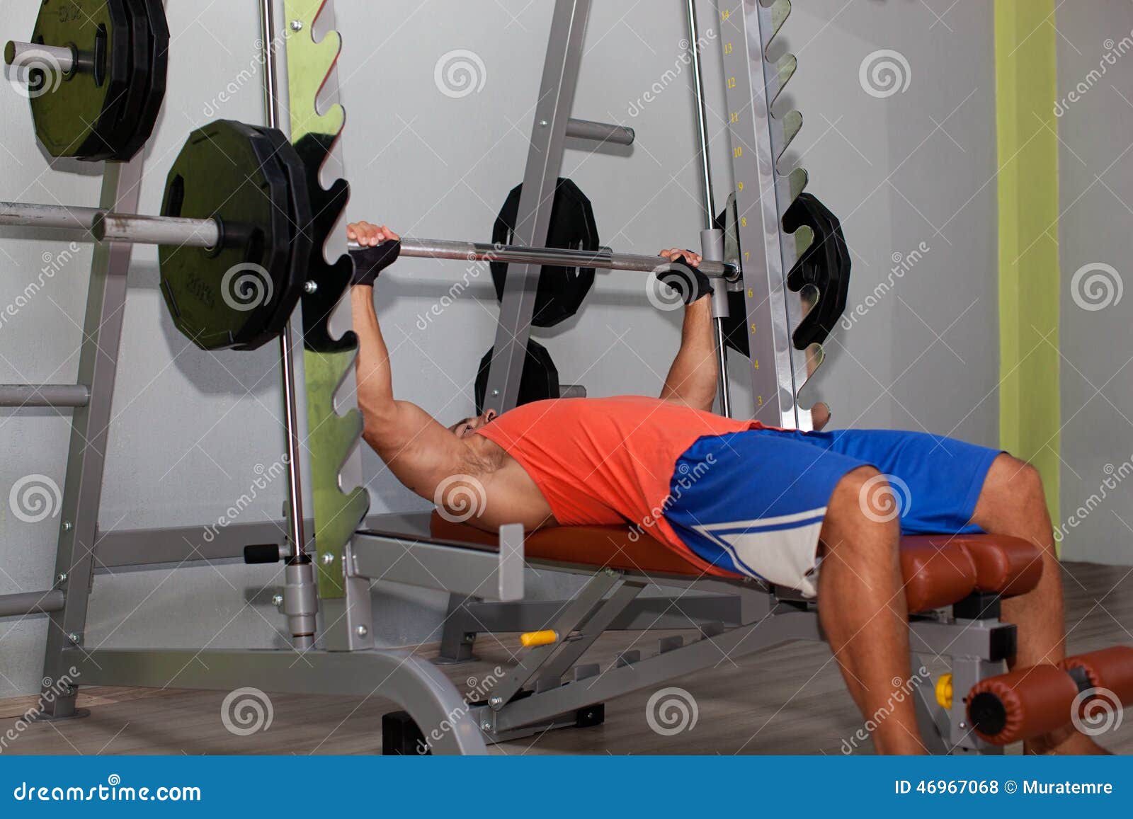 Muscular Man on Bench Press Exercises Stock Photo - Image of black ...