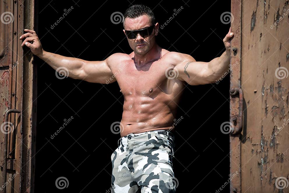 Muscular Man Catching a Train Stock Image - Image of portrait, body ...