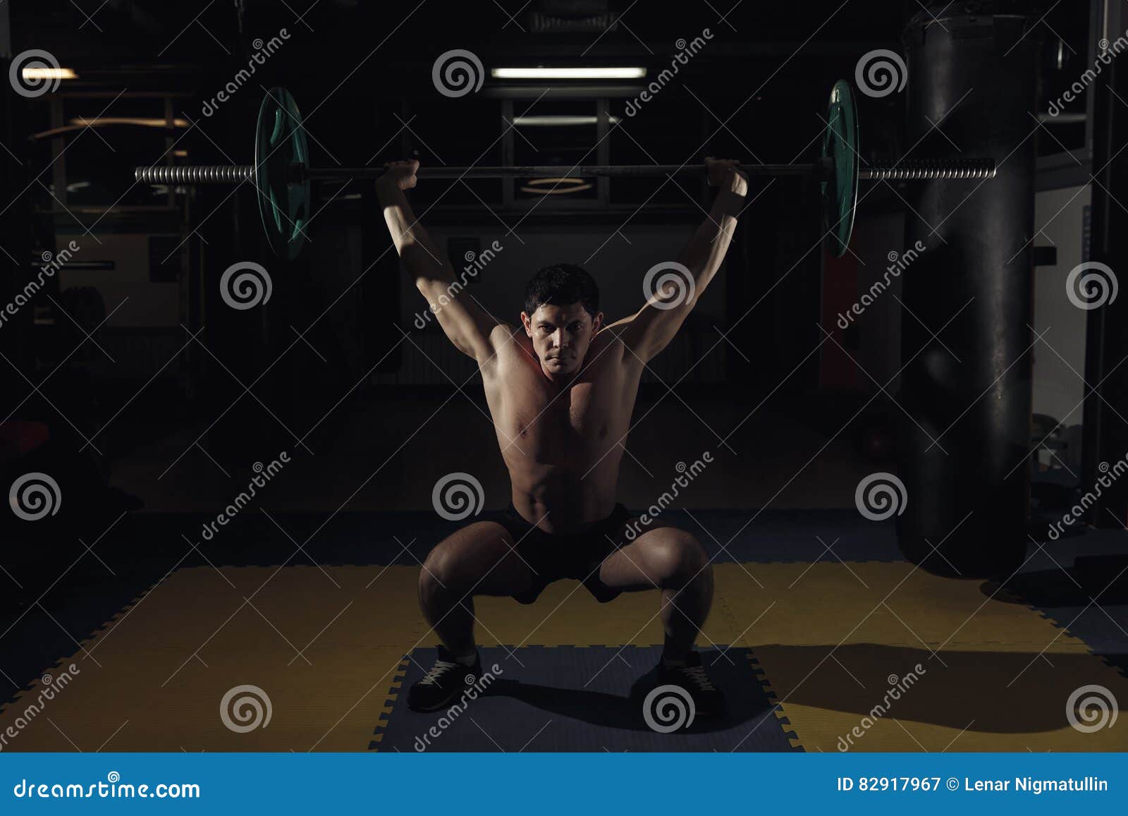 Muscular Man At A Crossfit Gym Lifting A Barbell Stock Image Image