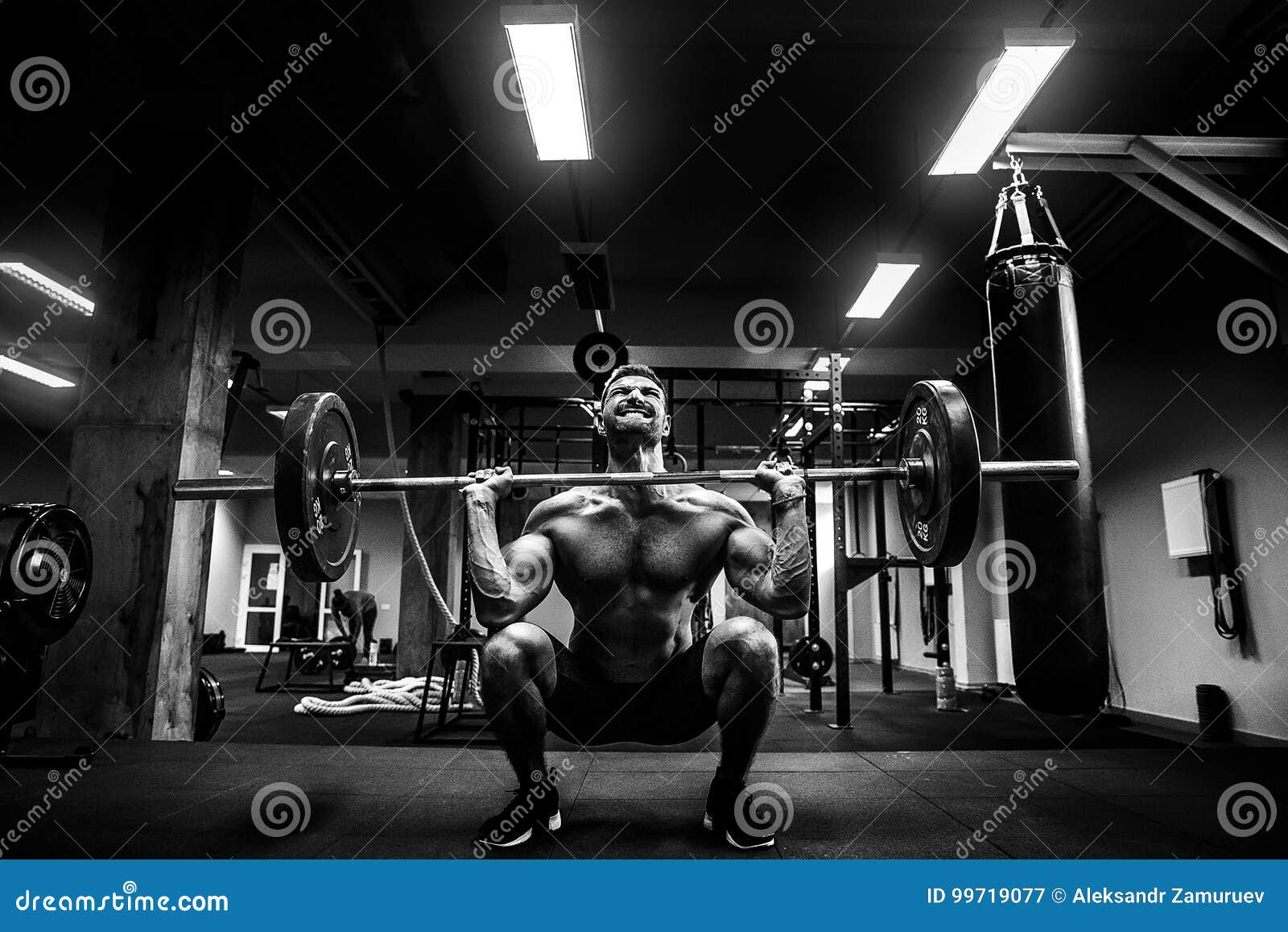Muscular Man At A Crossfit Gym Lifting A Barbell Stock Image Image