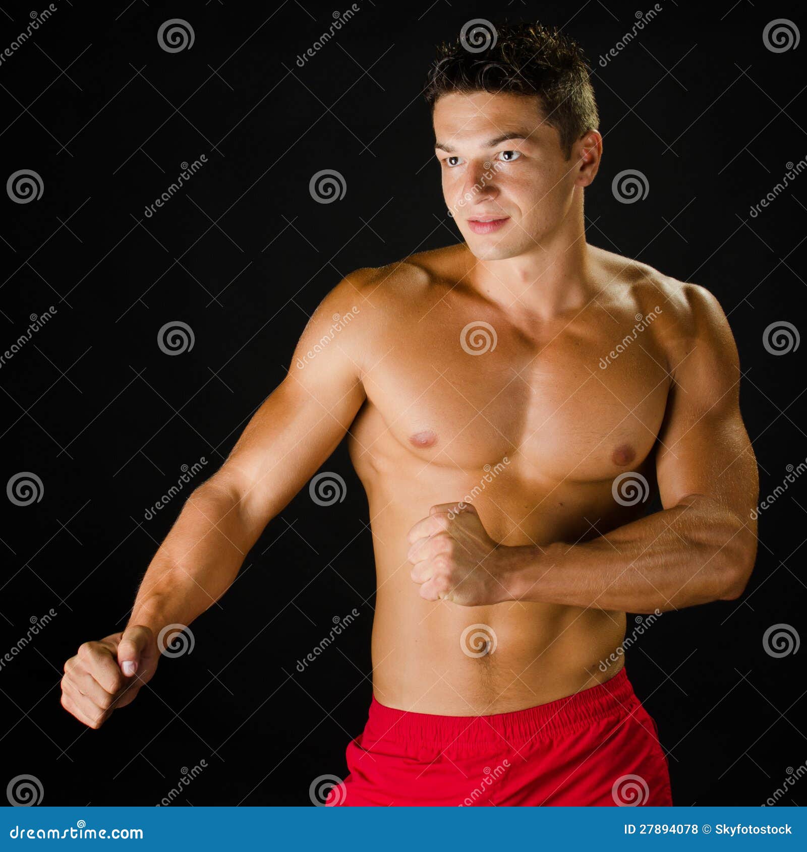 Muscular Man Defending Himself Stock Photo - Image of muscular ...