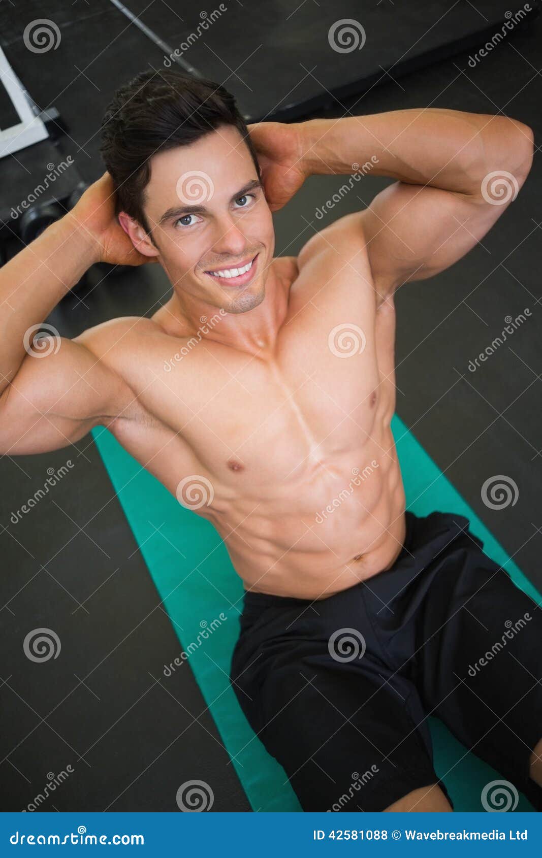 Muscular Man Doing Abdominal Crunches in Gym Stock Photo - Image of ...