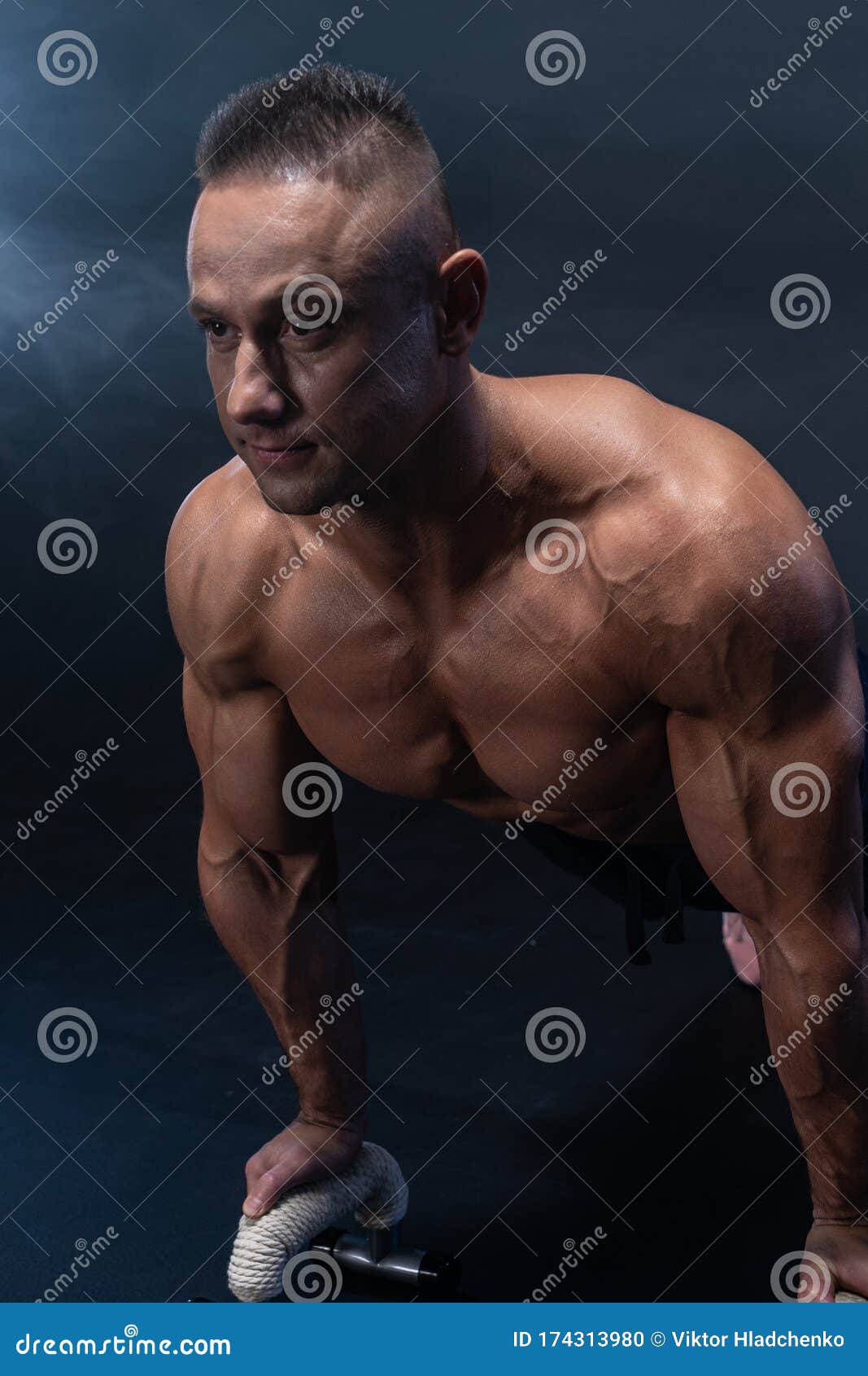 Muscular Man Doing Calisthenic Exercise Isolated on the Black ... Muscular Man Doing Calisthenic Exercise Isolated on the Black ...