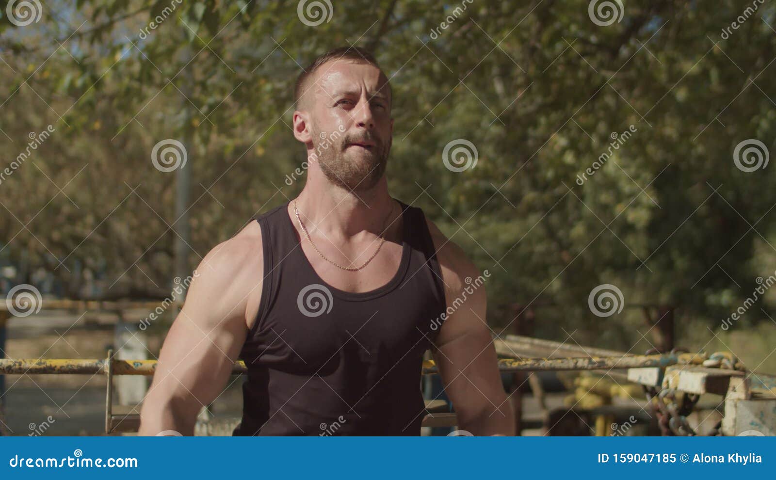 Muscular Man Doing Dumbbell Shoulder Fly Outdoors Stock Video - Video ...