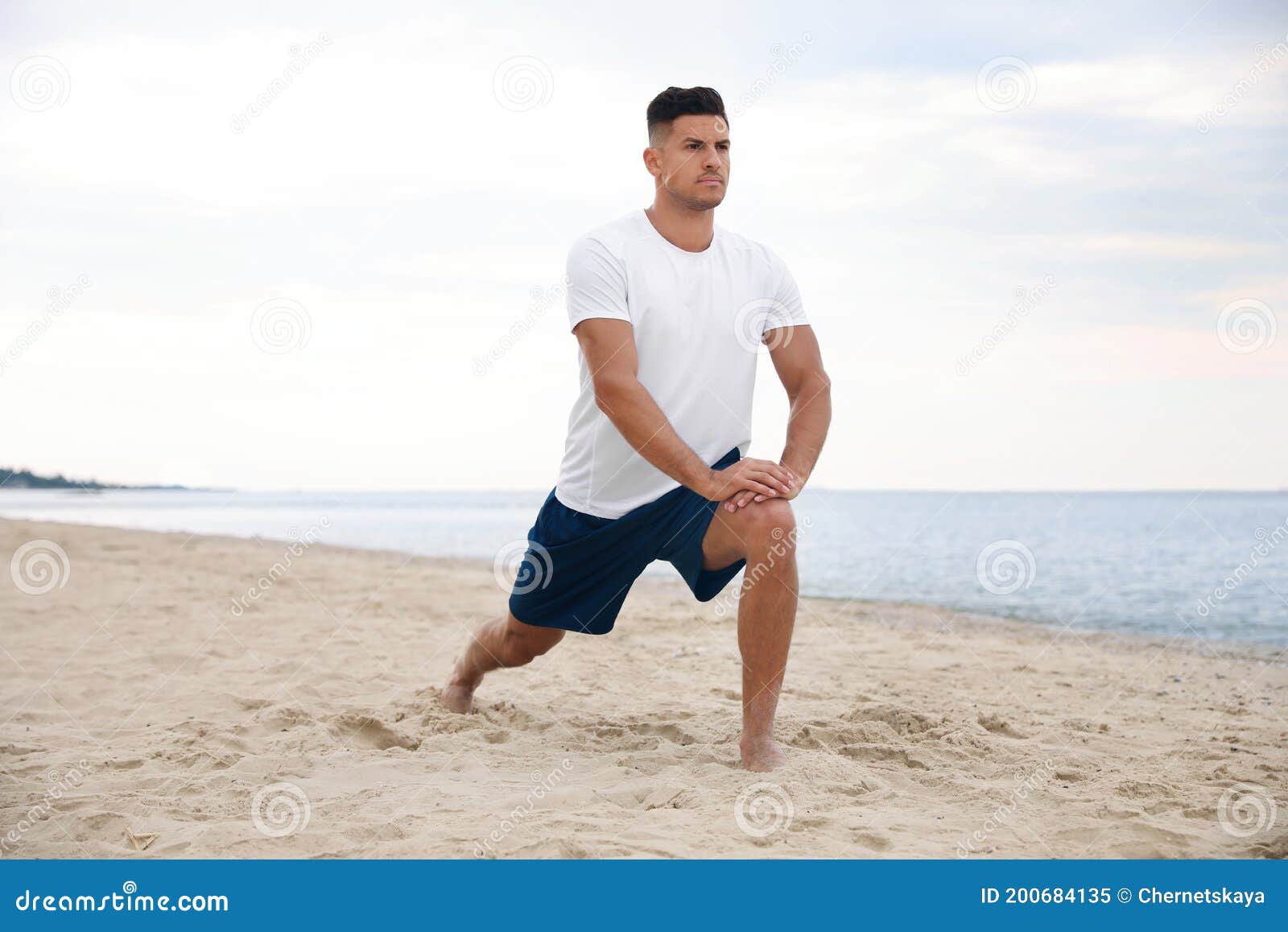Muscular Man Doing Exercise on Beach. Body Training Stock Image - Image ...