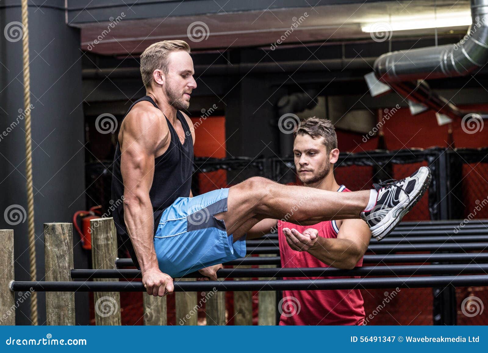 Muscular Man Doing Exercises on Parallel Bar Stock Image - Image of ...