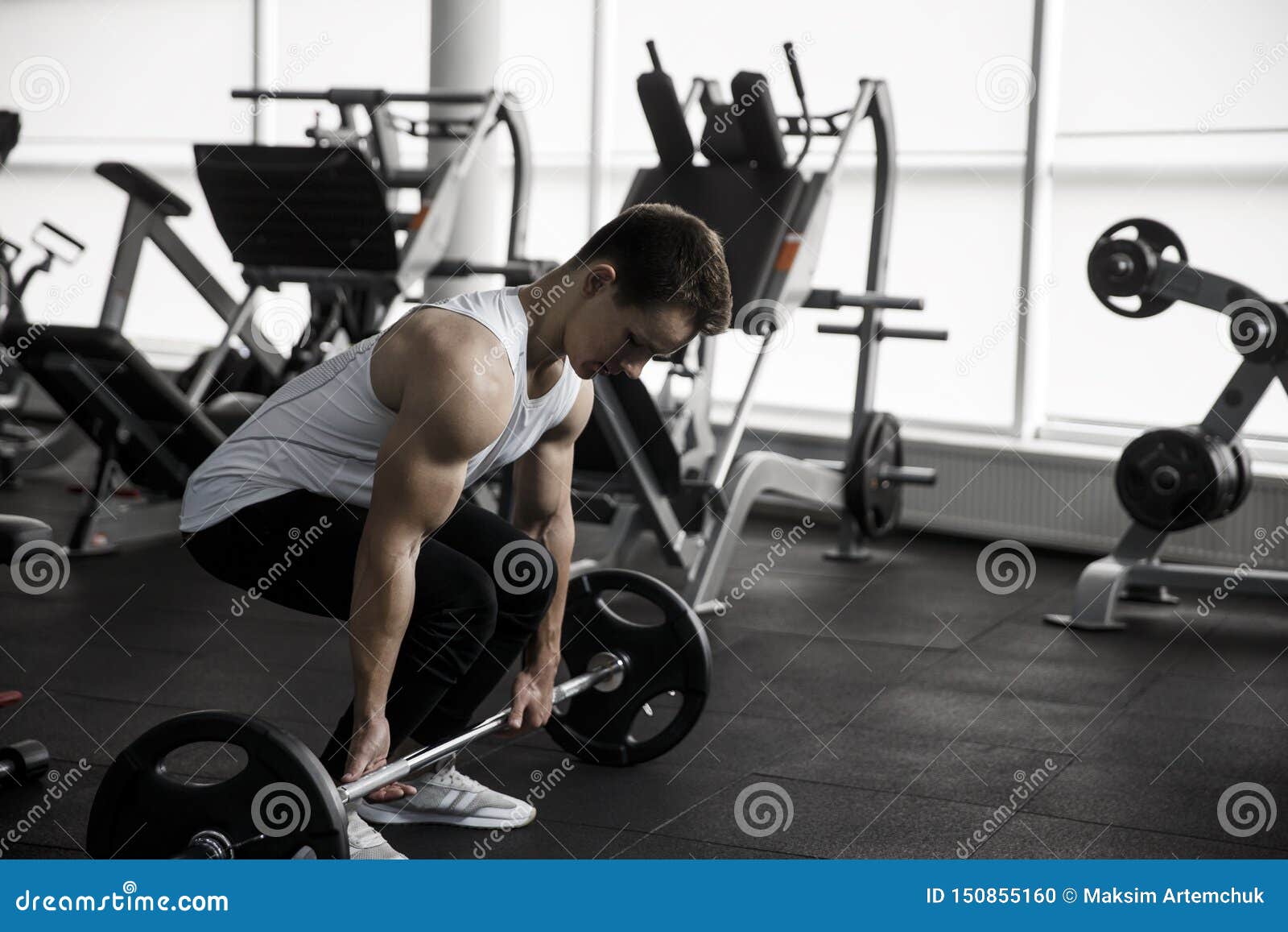 Muscular Man Doing Heavy Deadlift Exercise in Gym Stock Photo - Image ...