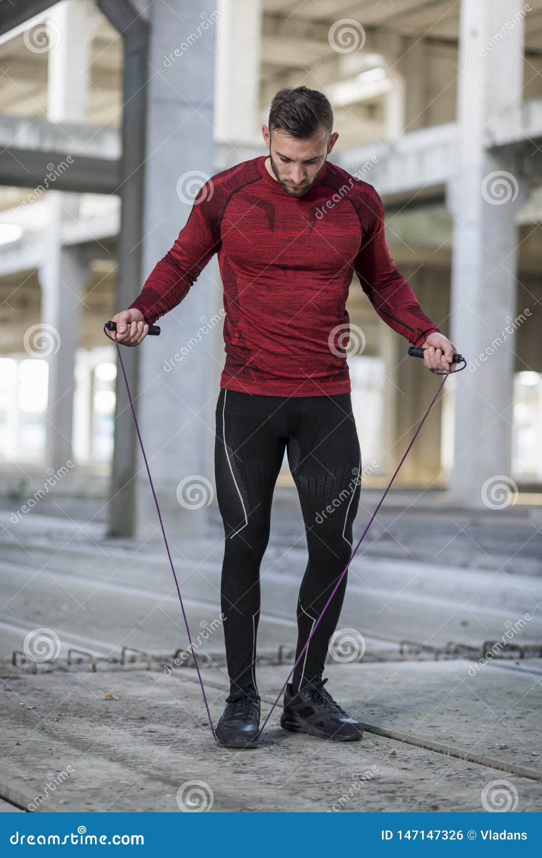 Muscular Man Doing a Jumping Rope Exercises Stock Photo - Image of ...
