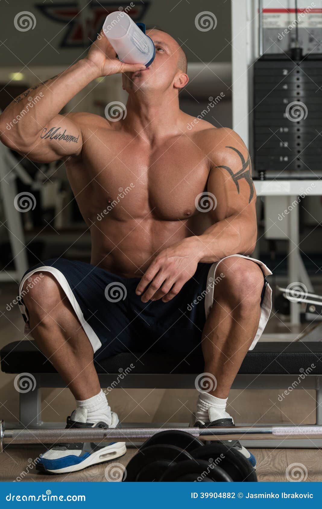Muscular Man Drinking Water from Shaker Stock Photo - Image of pectoral ...