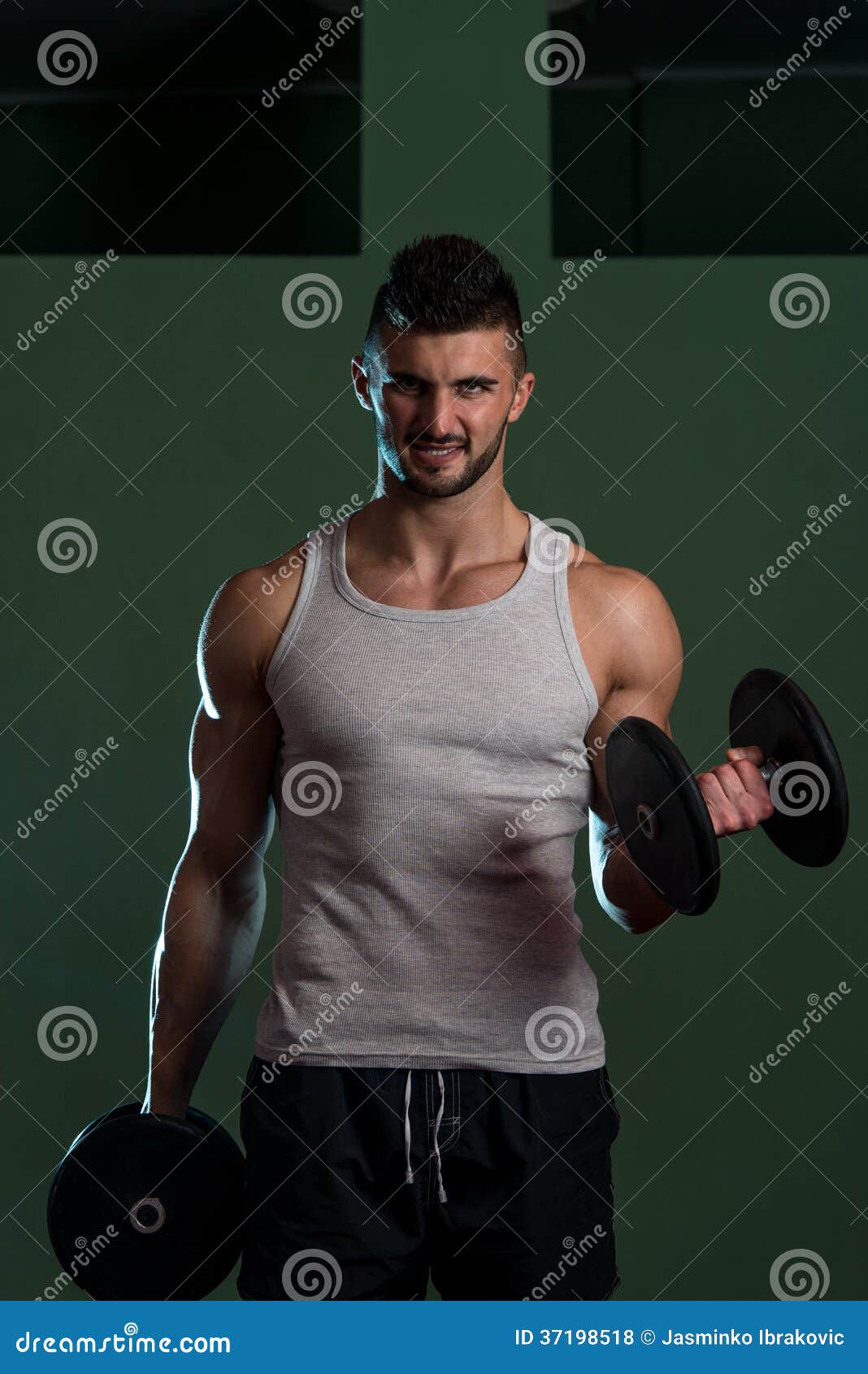Muscular Man Exercising Biceps Stock Photo - Image of leisure, athletic ...