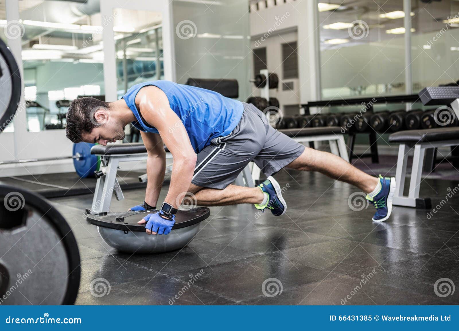 Muscular Man Exercising with Bosu Ball Stock Image - Image of ...