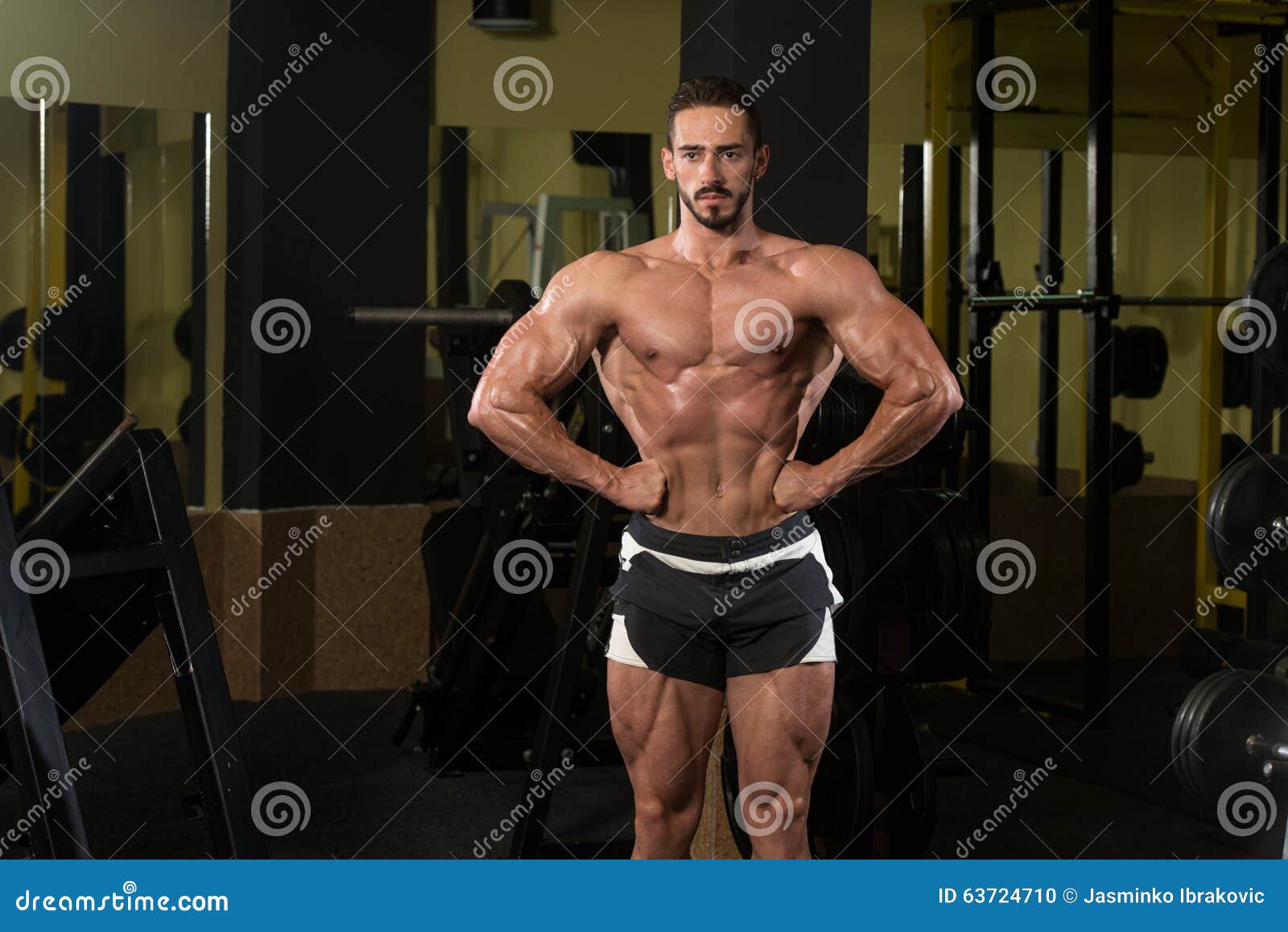 Muscular Man Flexing Muscles Stock Photo - Image of chest, healthy ...