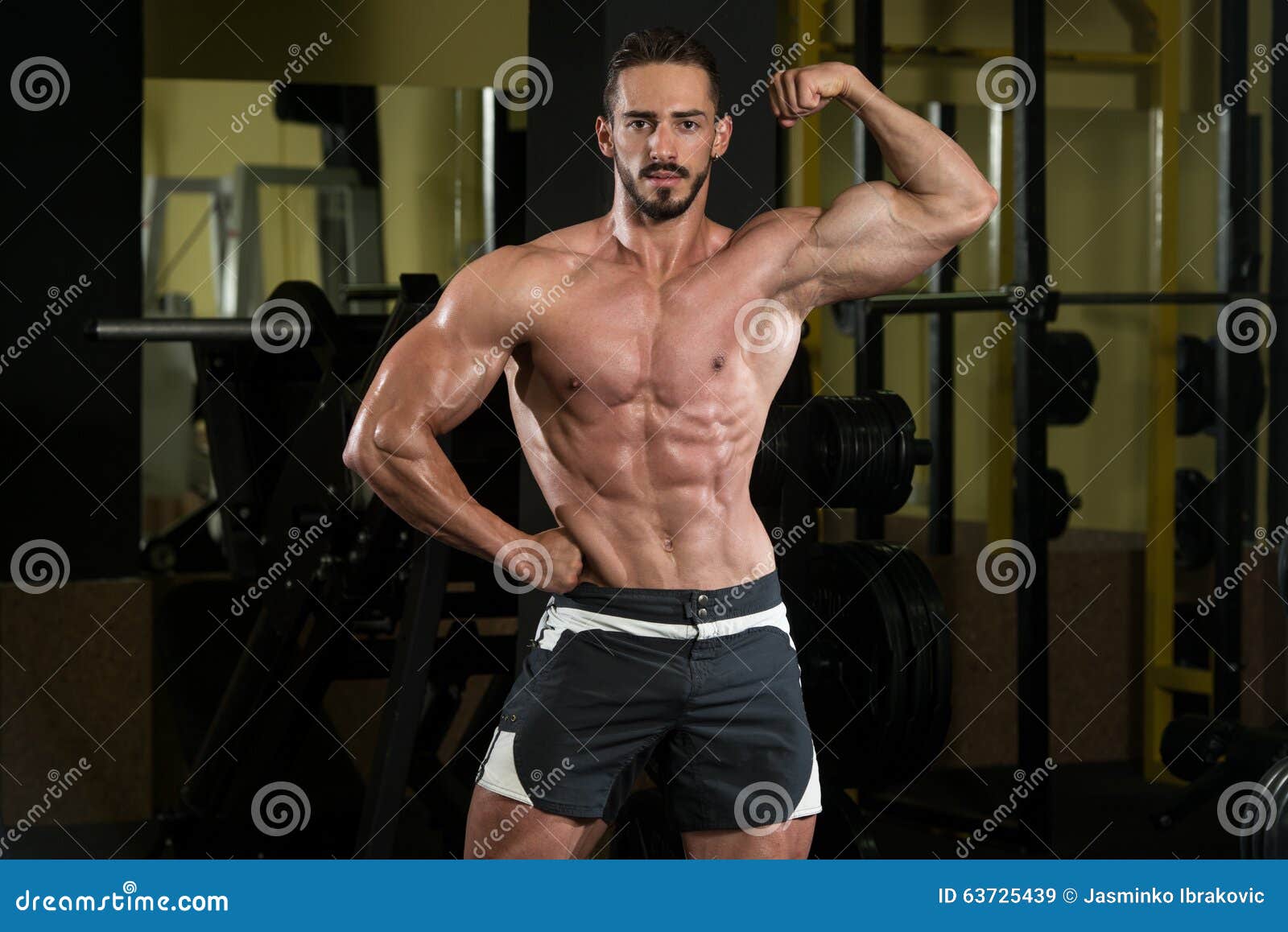 Muscular Man Flexing Muscles Stock Image - Image of exercises, eating ...