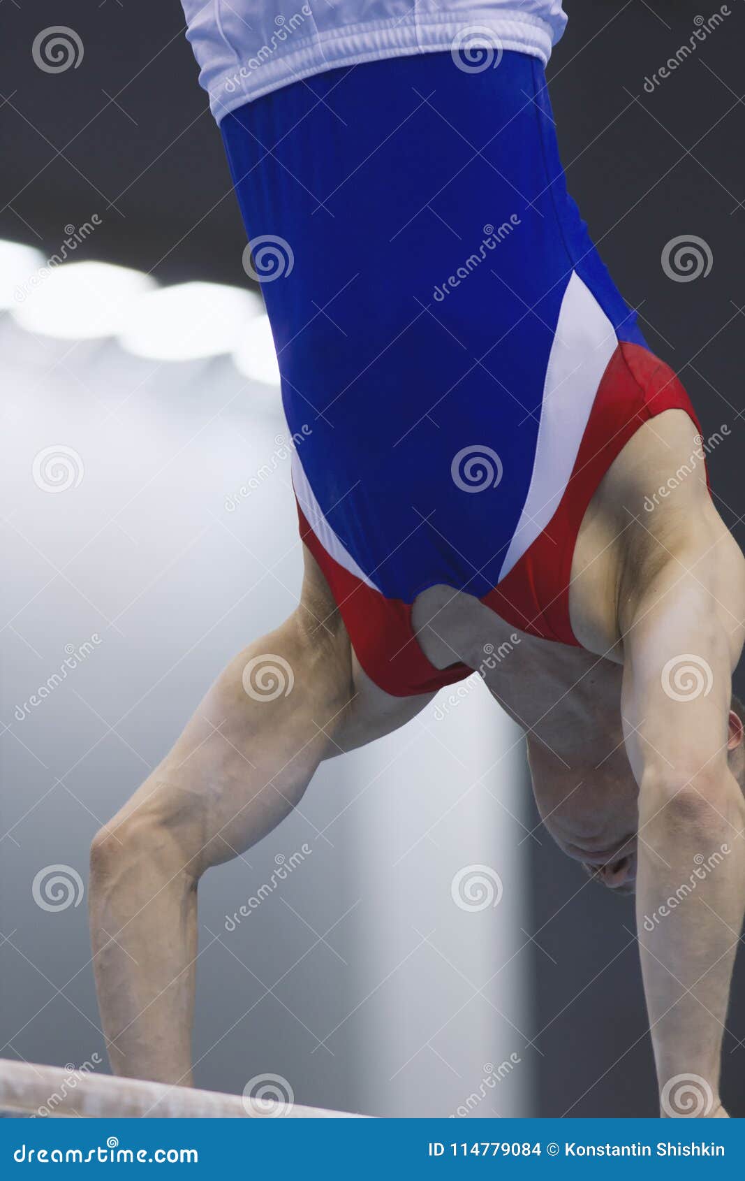 Muscular Man Gymnasts Competing on the Bar Editorial Stock Image ...
