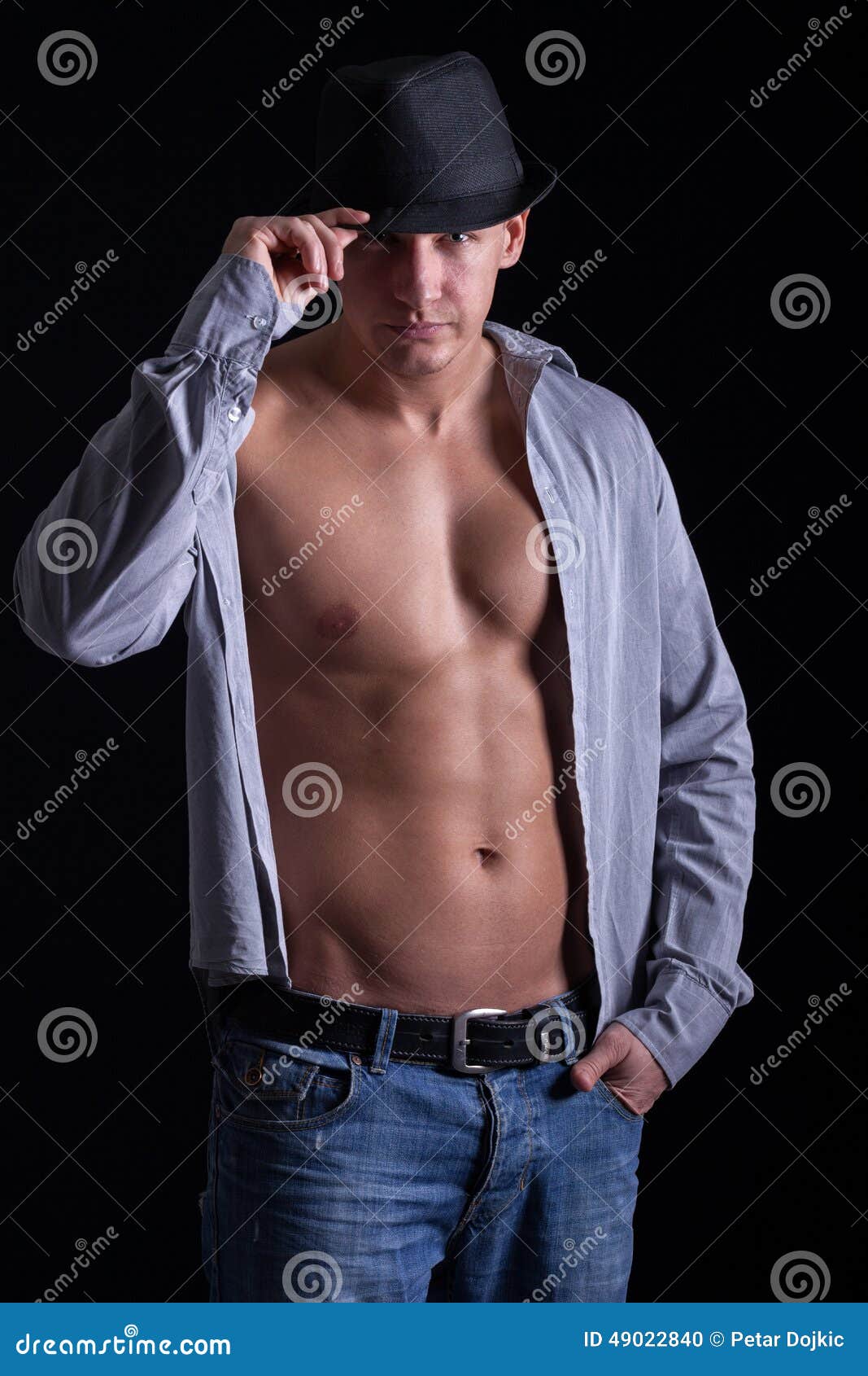 Muscular Man with Hat Posing,on Black Background Stock Photo - Image of ...