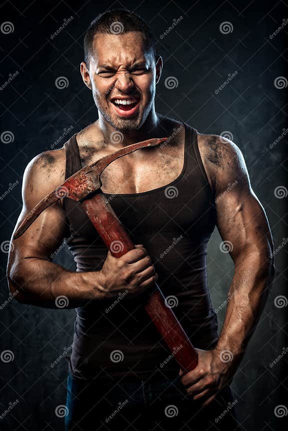 Muscular Man Holding Pickaxe Stock Image - Image of mattock, industrial ...