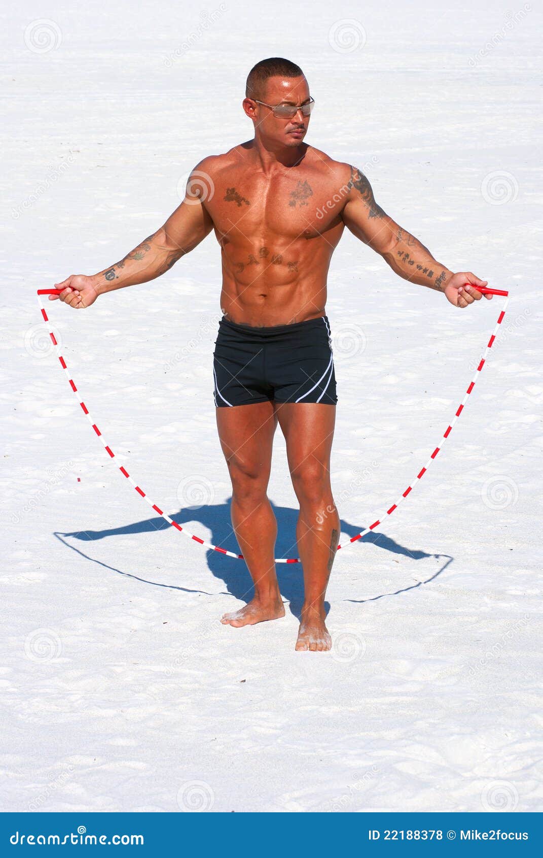 Muscular Man With Rope Stock Photo | CartoonDealer.com #61941714