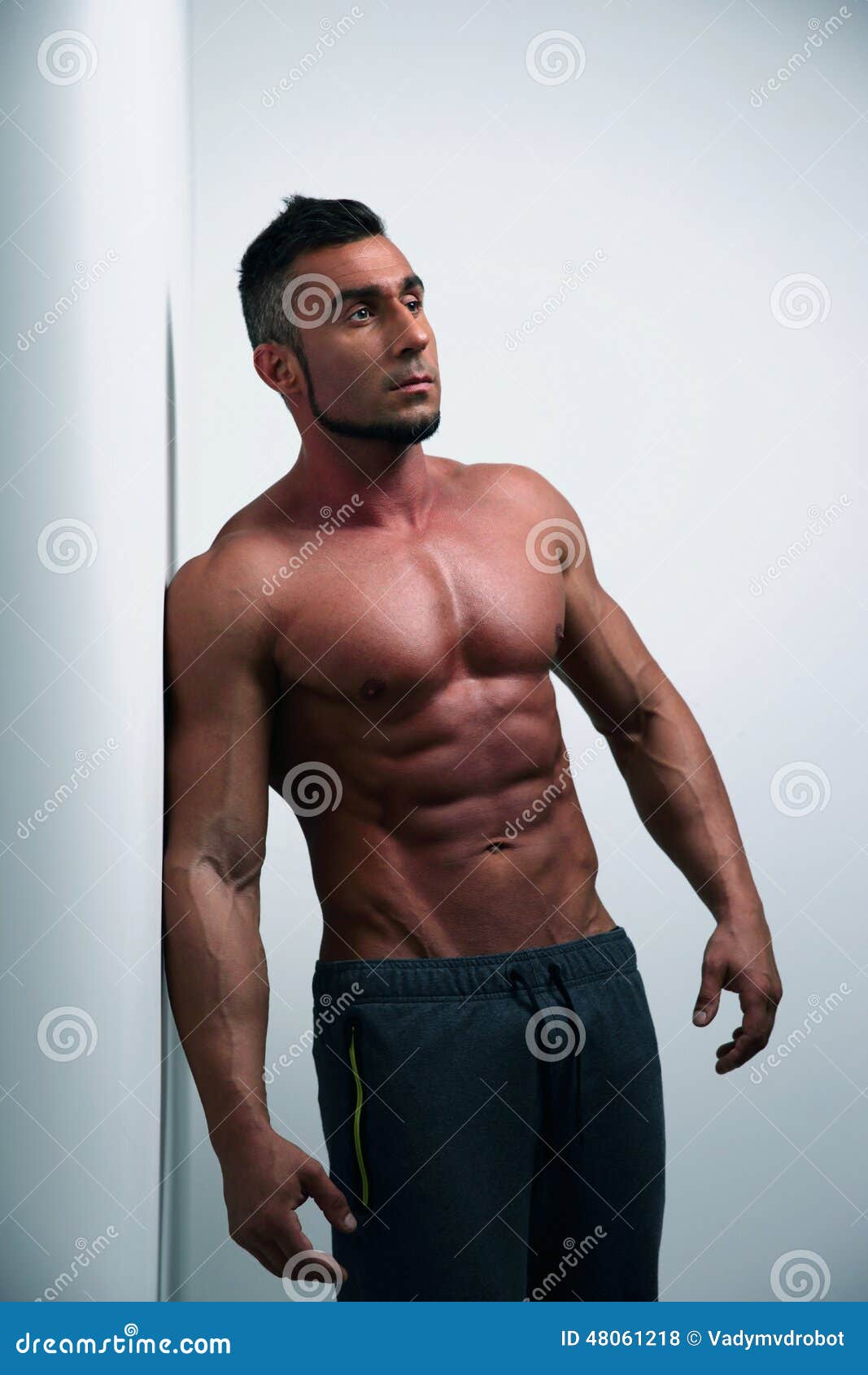 Muscular Man Leaning on the Wall Stock Photo - Image of copyspace, copy ...