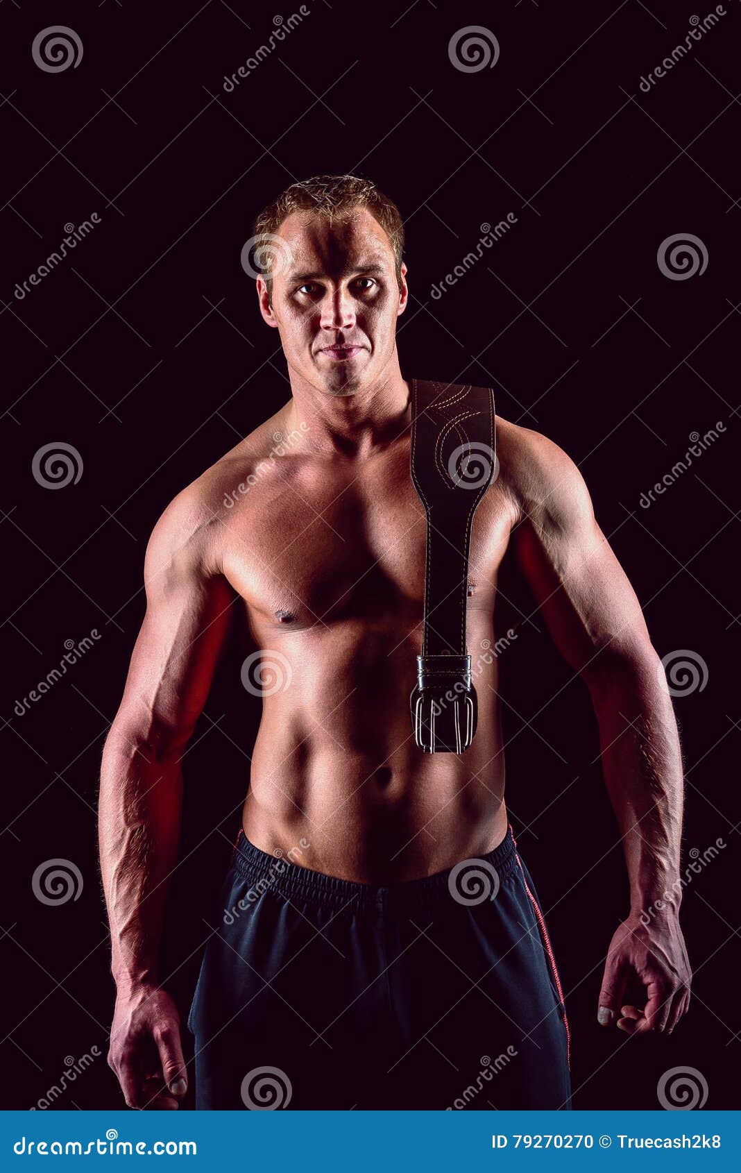 Muscular Man in with Lifting Belt Posing Over Dark Background. Stock ...