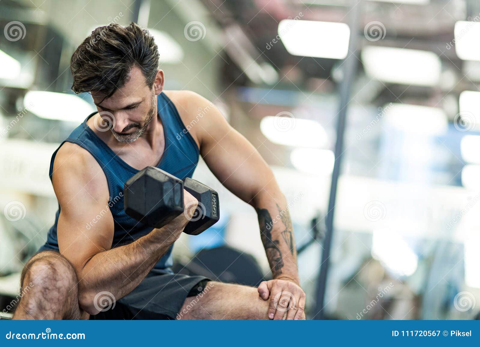 Muscular Man Lifting Weights Stock Image - Image of exercising ...