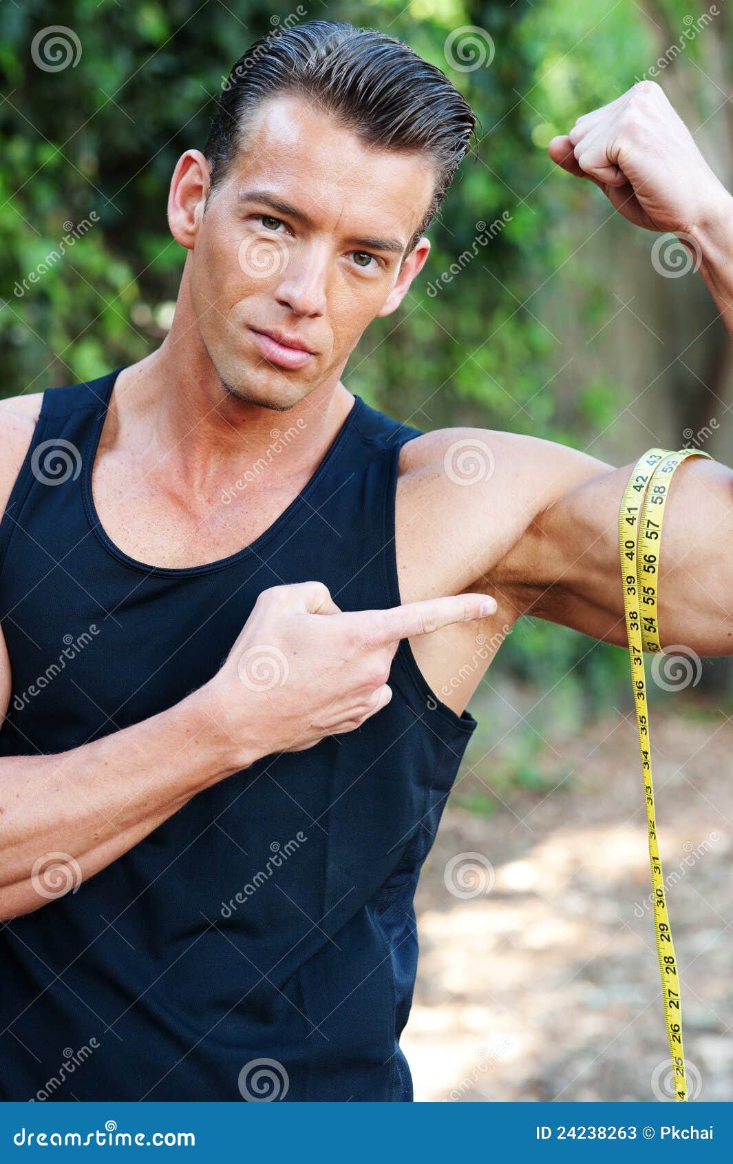 Muscular Man Measuring Bicep Stock Image - Image of handsome ...