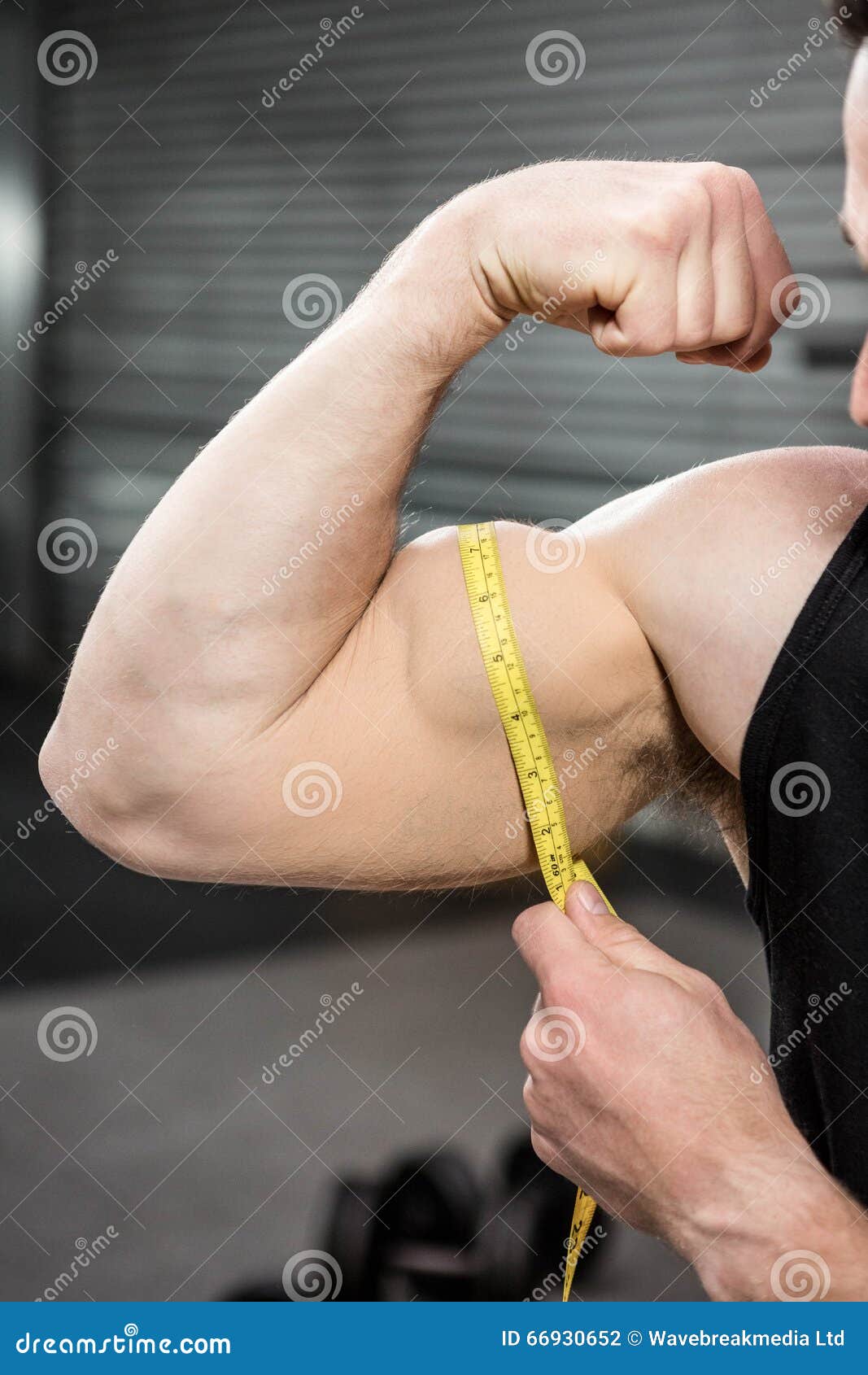Muscular Man Measuring Biceps Stock Photo - Image of fitness, athletic ...