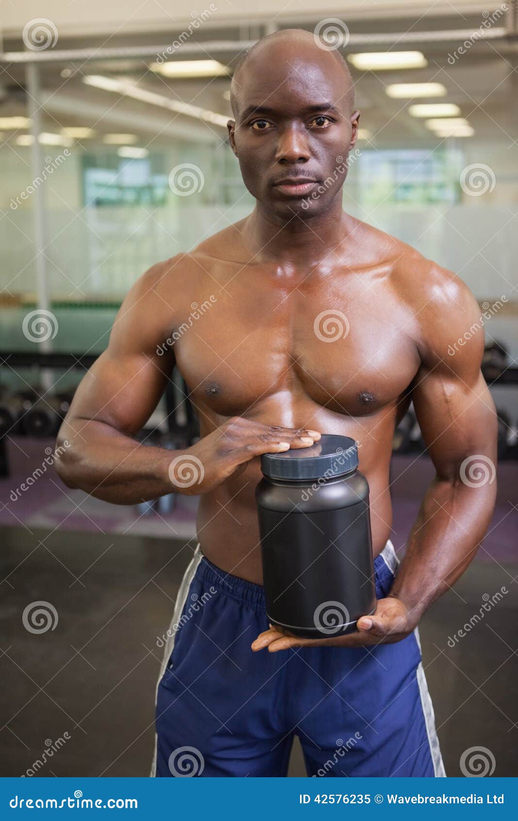 Muscular Man with Nutritional Supplement Stock Image - Image of ...