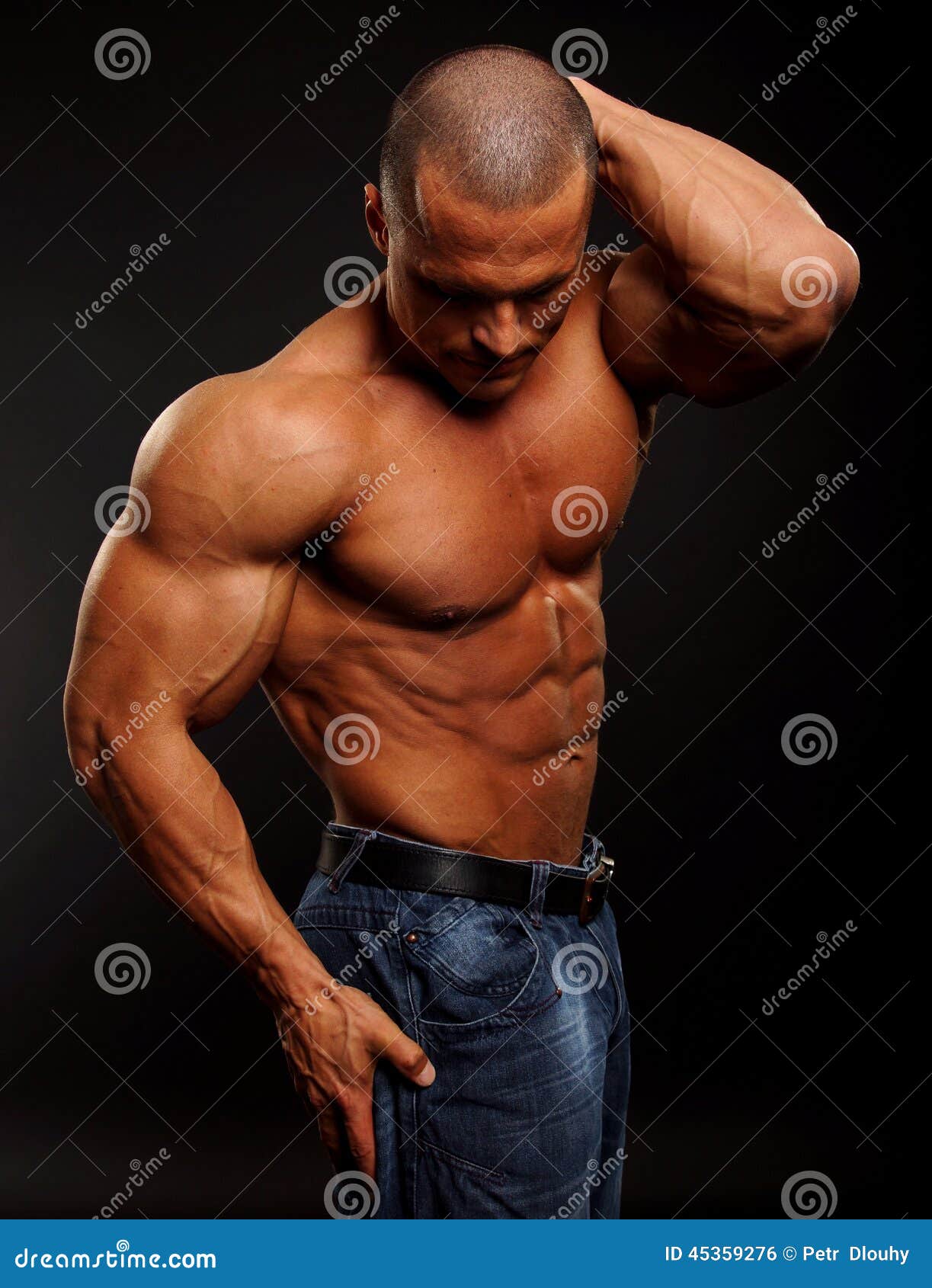 Muscular man poses stock photo. Image of sports, shoulder - 45359276